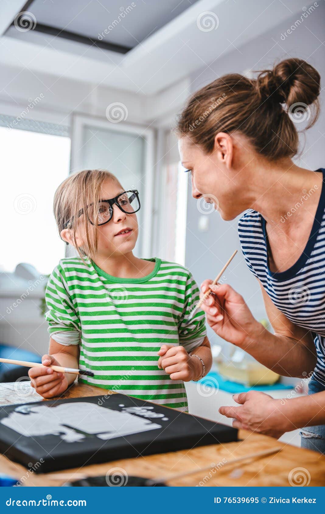 Art Teacher Helping a Student with Painting Stock Image - Image of ...