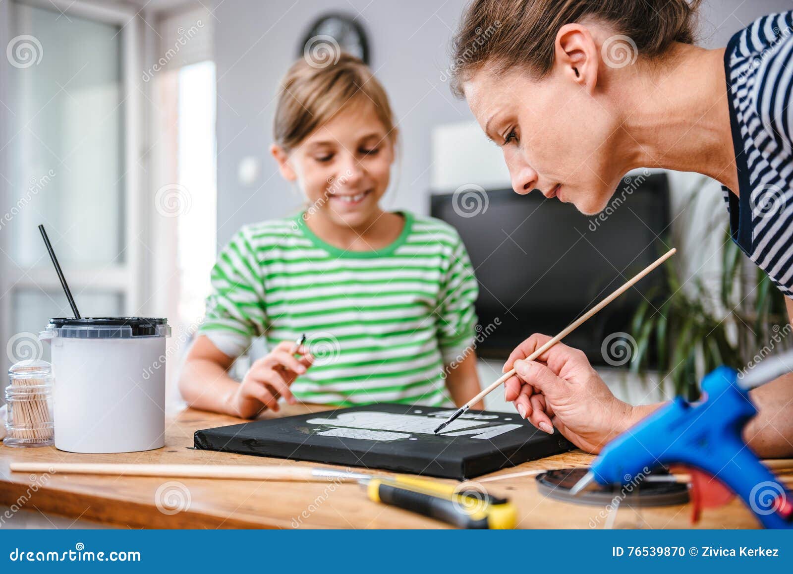 Art Teacher Helping a Student with Painting Stock Photo - Image of copy ...