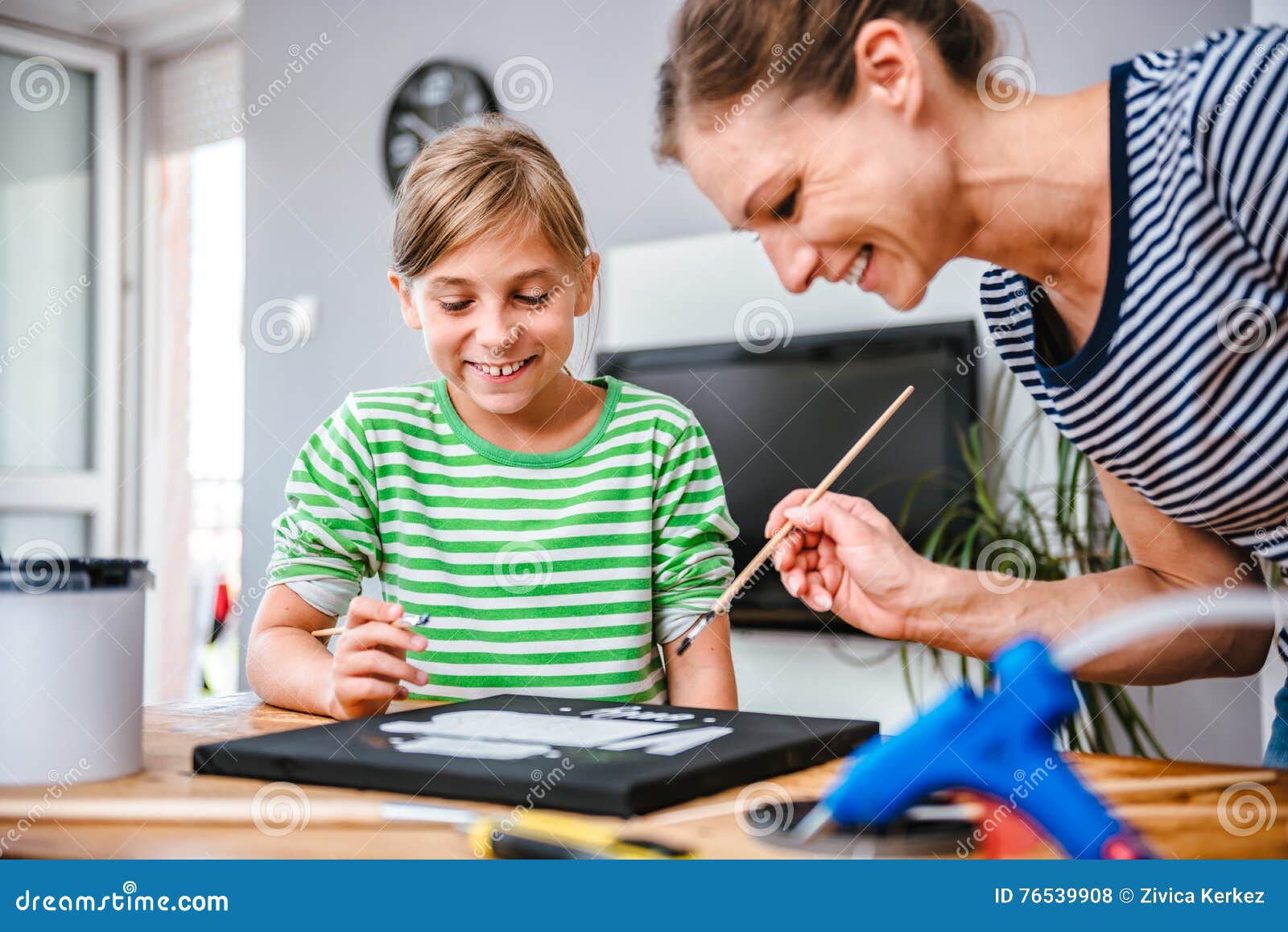 Art Teacher Helping a Student with Painting Stock Photo - Image of ...