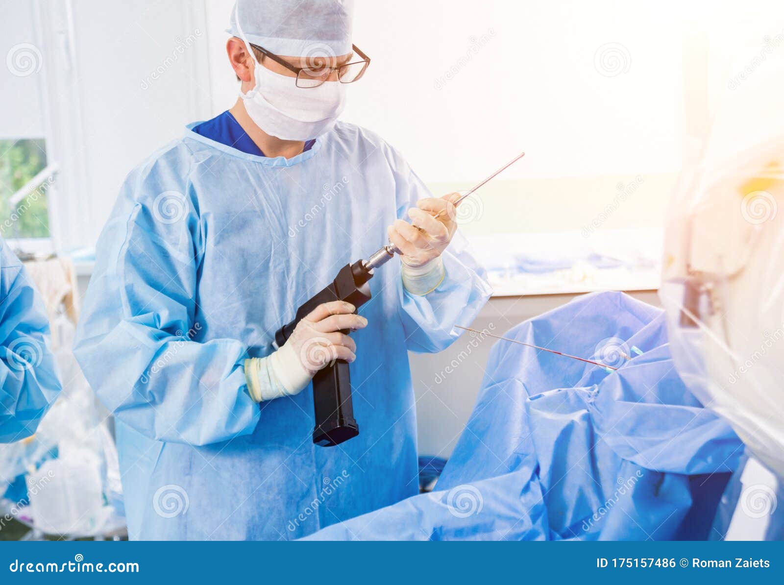 Arthroscope Surgery. Orthopedic Surgeons in Teamwork in the Operating ...