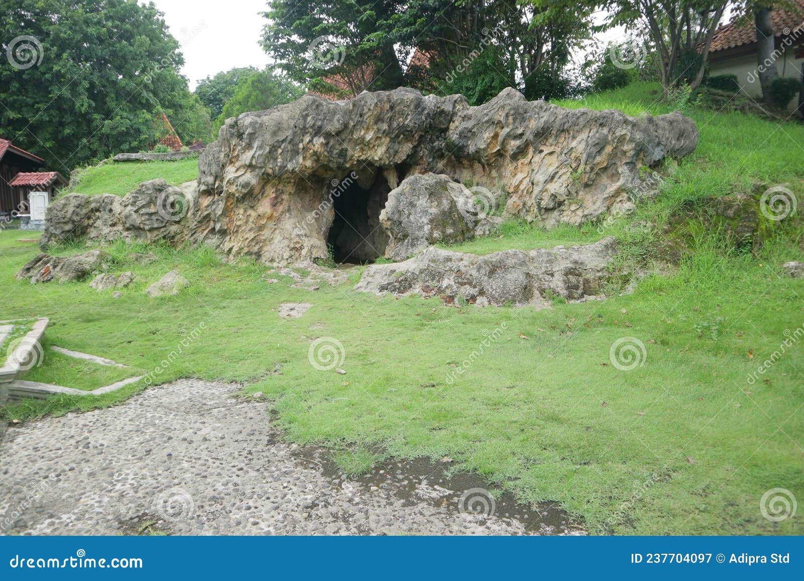 Artificial Cave in the Middle of the Park with Green Grass Stock Image ...
