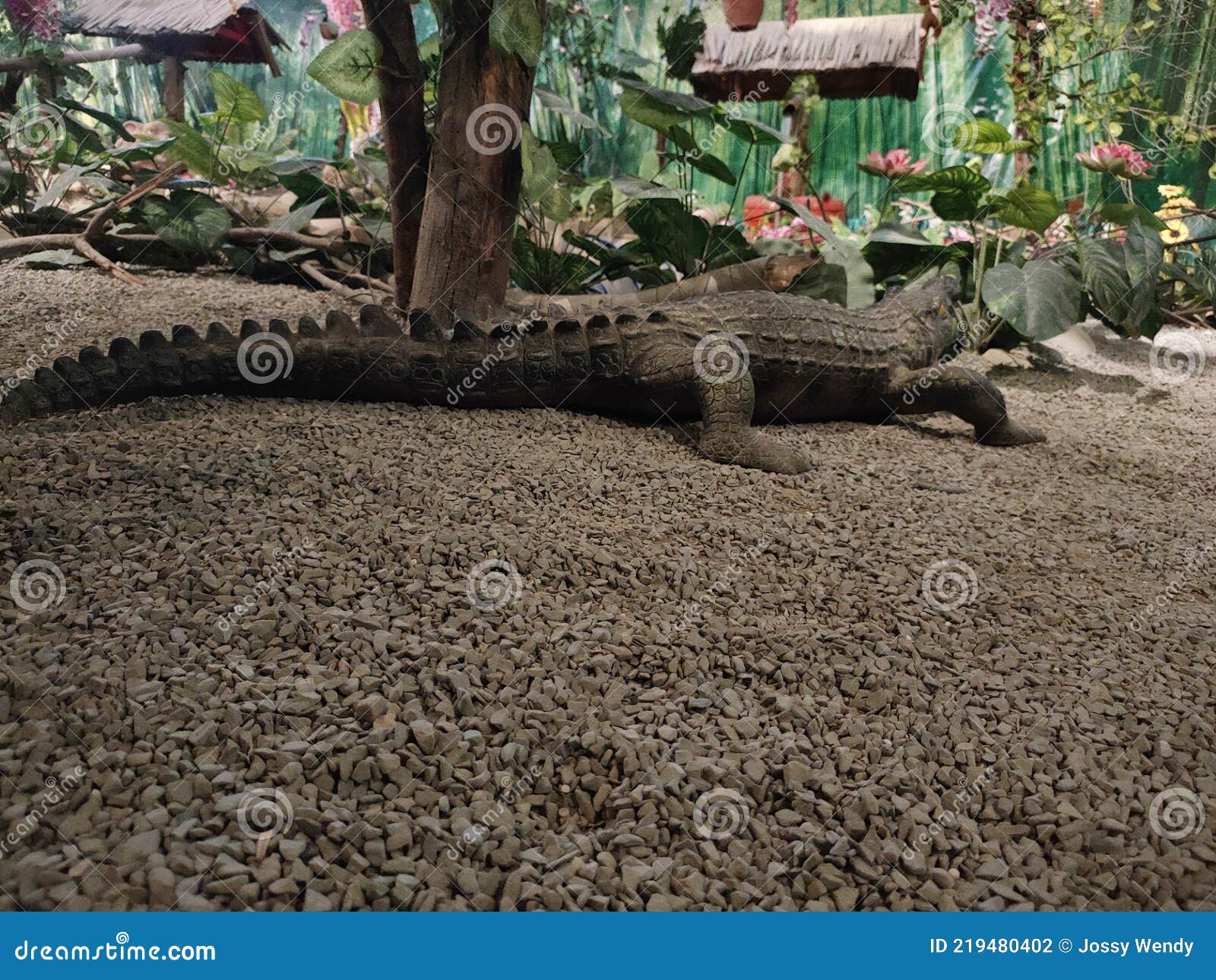 The Artificial Crocodile in an Artificial Garden. Stock Photo - Image ...
