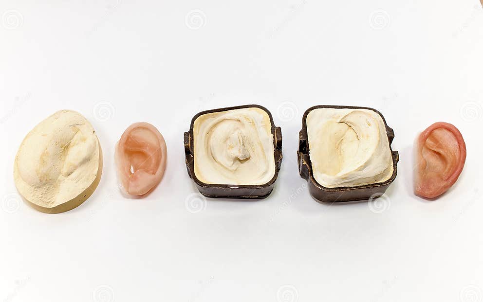 Artificial Ear Final Product and Plaster Forms Stock Photo - Image of ...