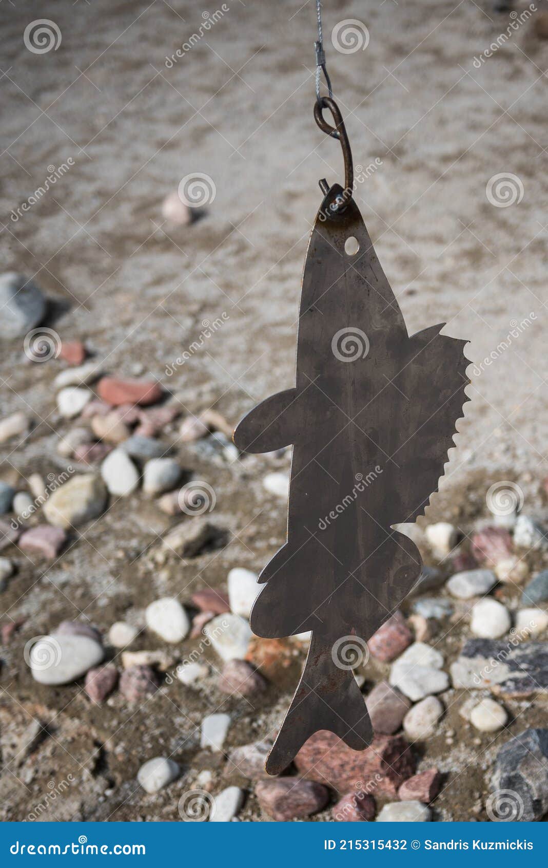 Artificial Fish from Metal on a Hook Stock Photo - Image of hook, water ...