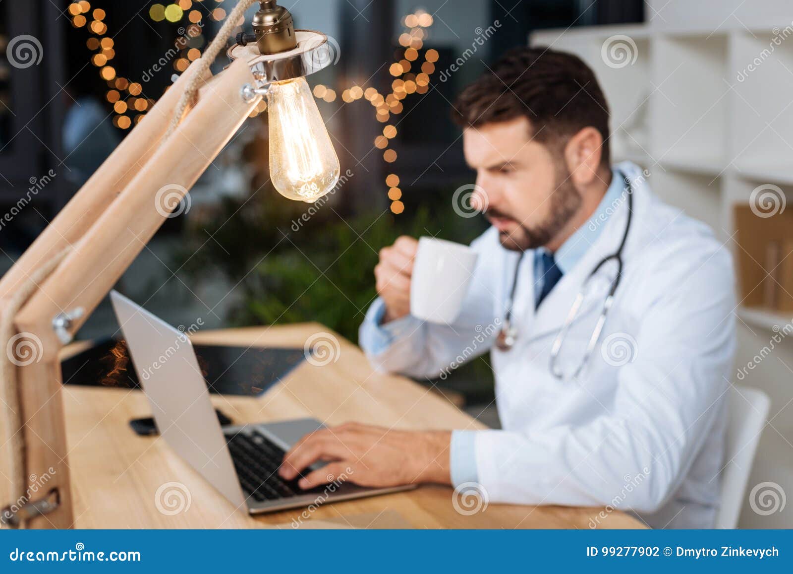 Selective Focus of a Light Bulb Stock Photo - Image of handsome, doctor ...