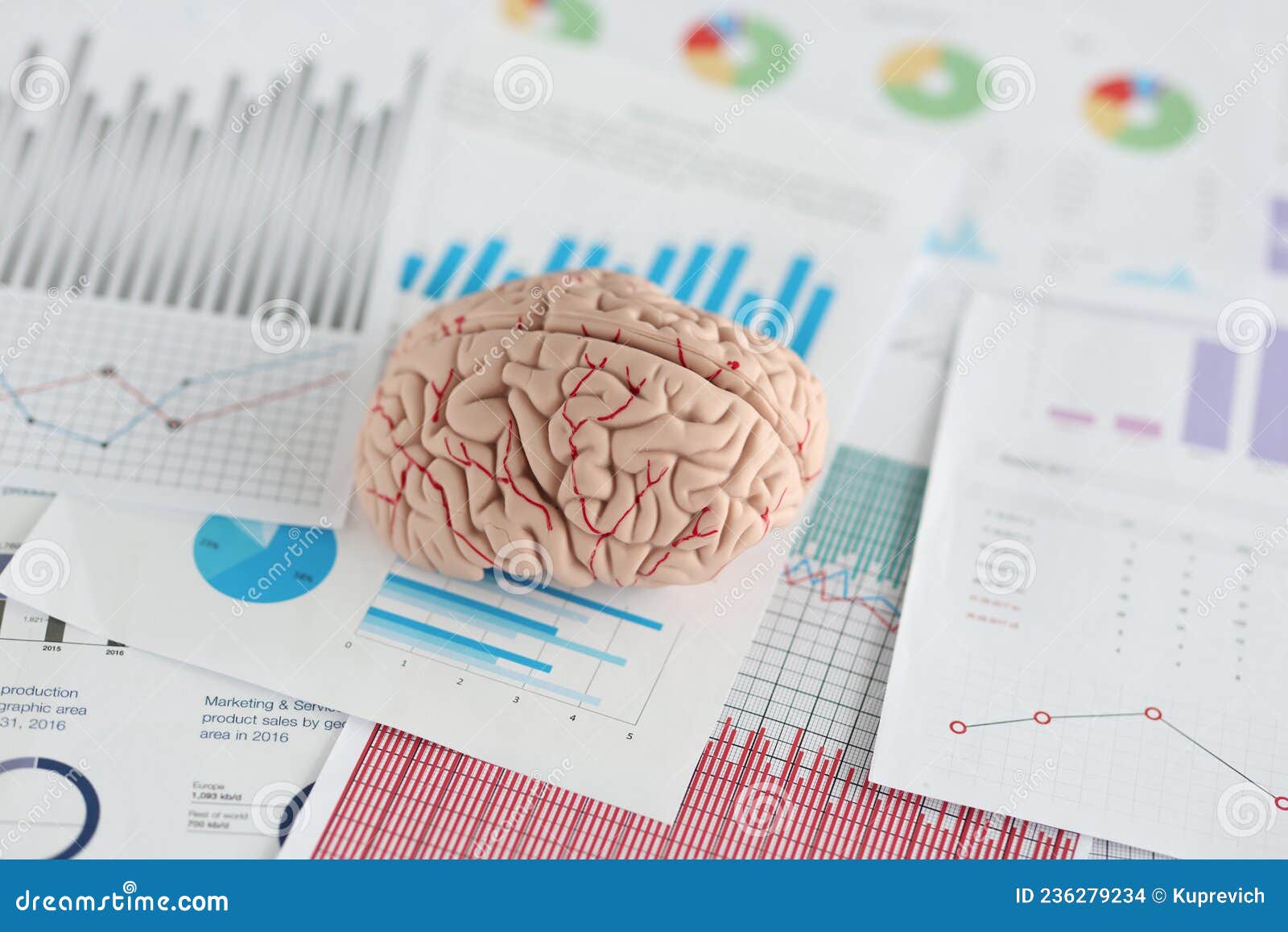 Artificial Model of Human Brain Lying on Documents with Graphs Closeup ...