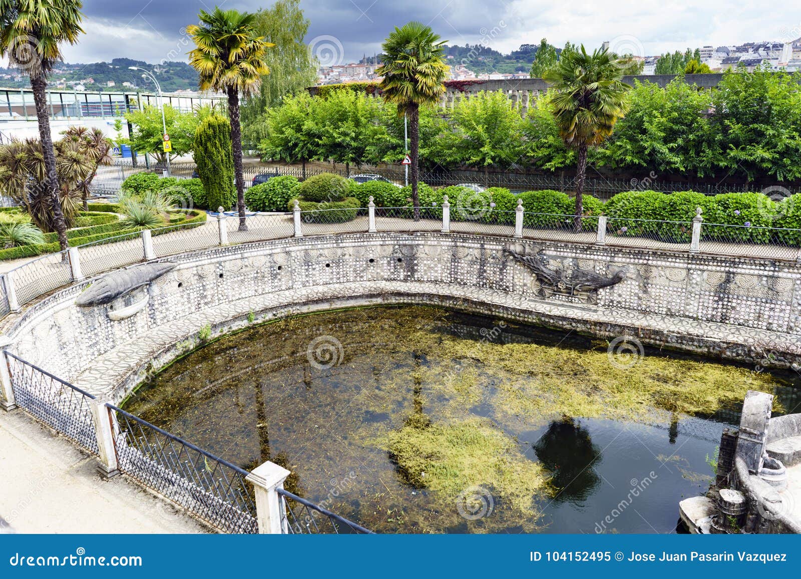 Artificial Pond Full of Algae and with the Edges of Stone Walls. Stock ...