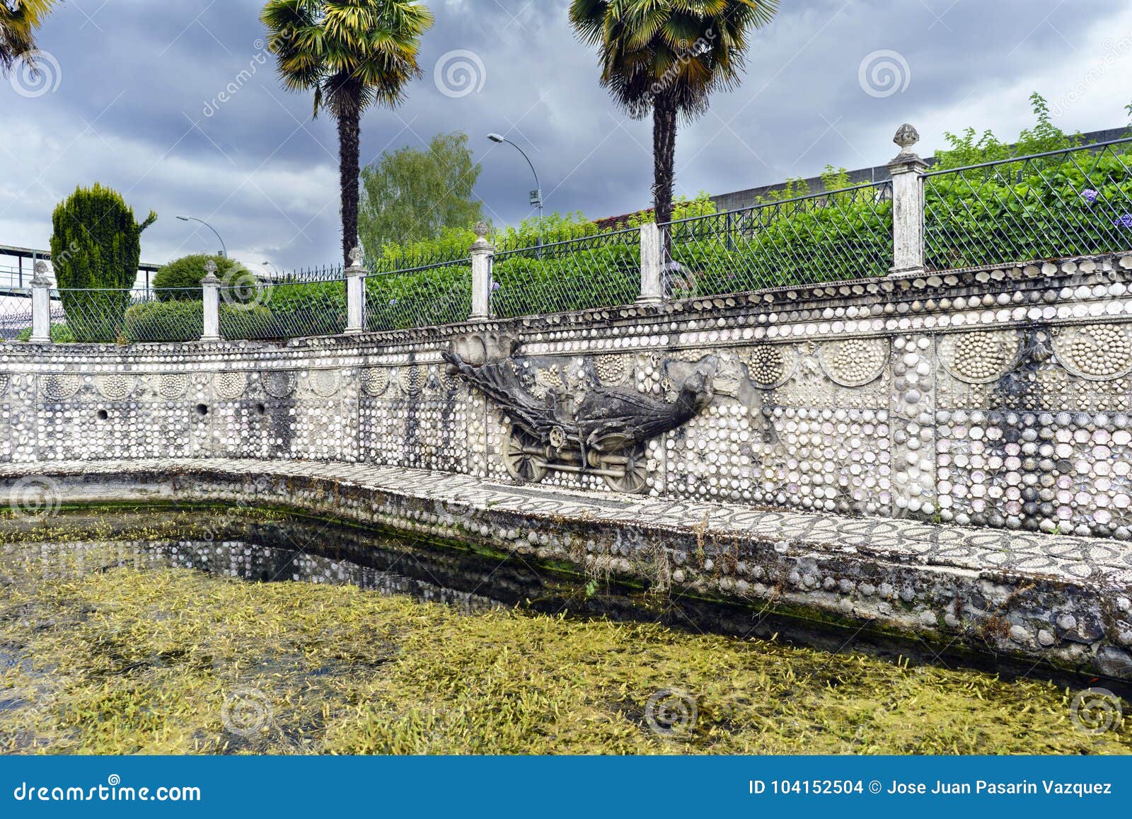 Artificial Pond Full of Algae and with the Edges of Stone Walls. Stock ...