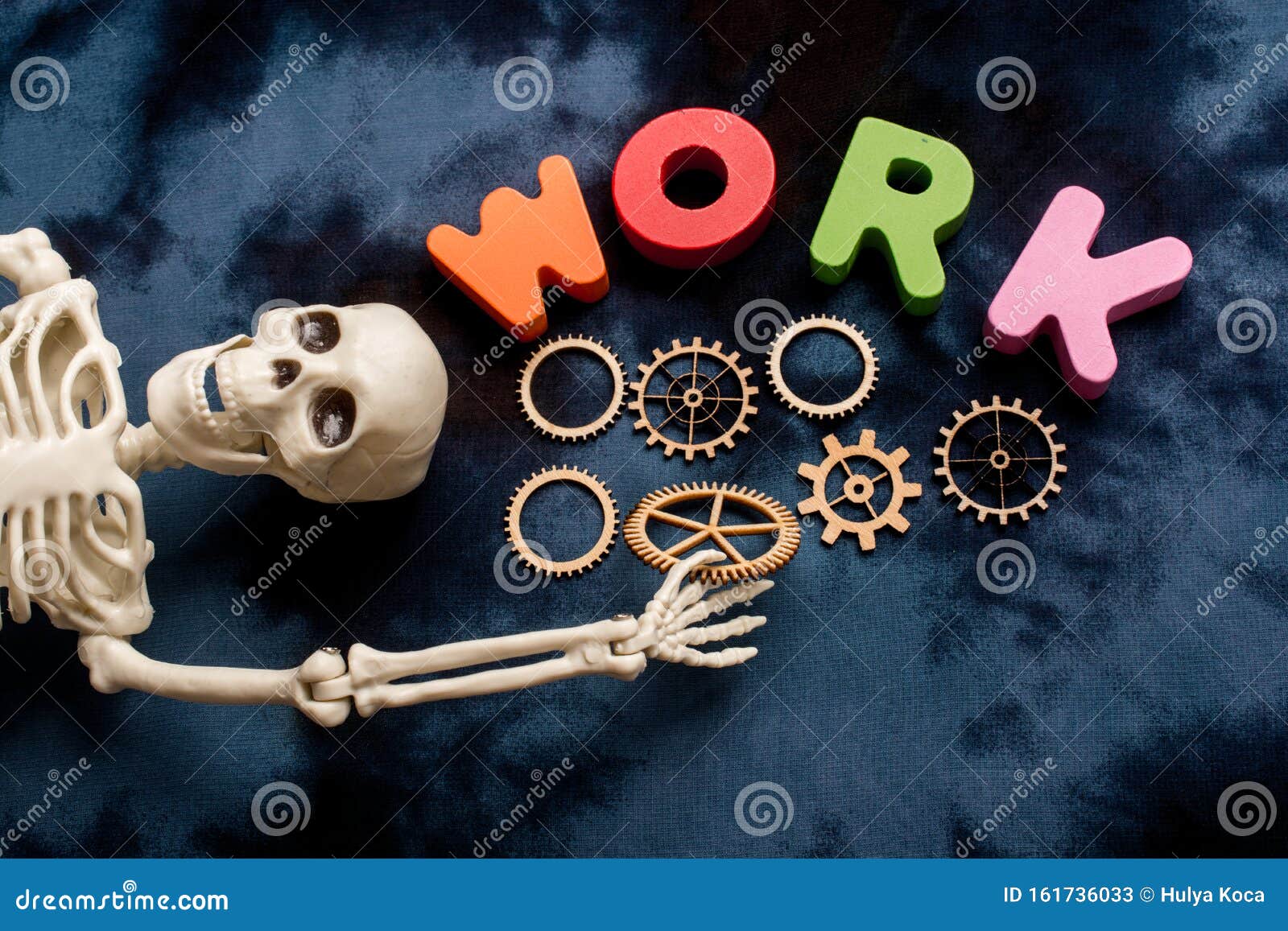 Artificial Skeleton, Work Wording and Wooden Cogwheels Stock Image ...