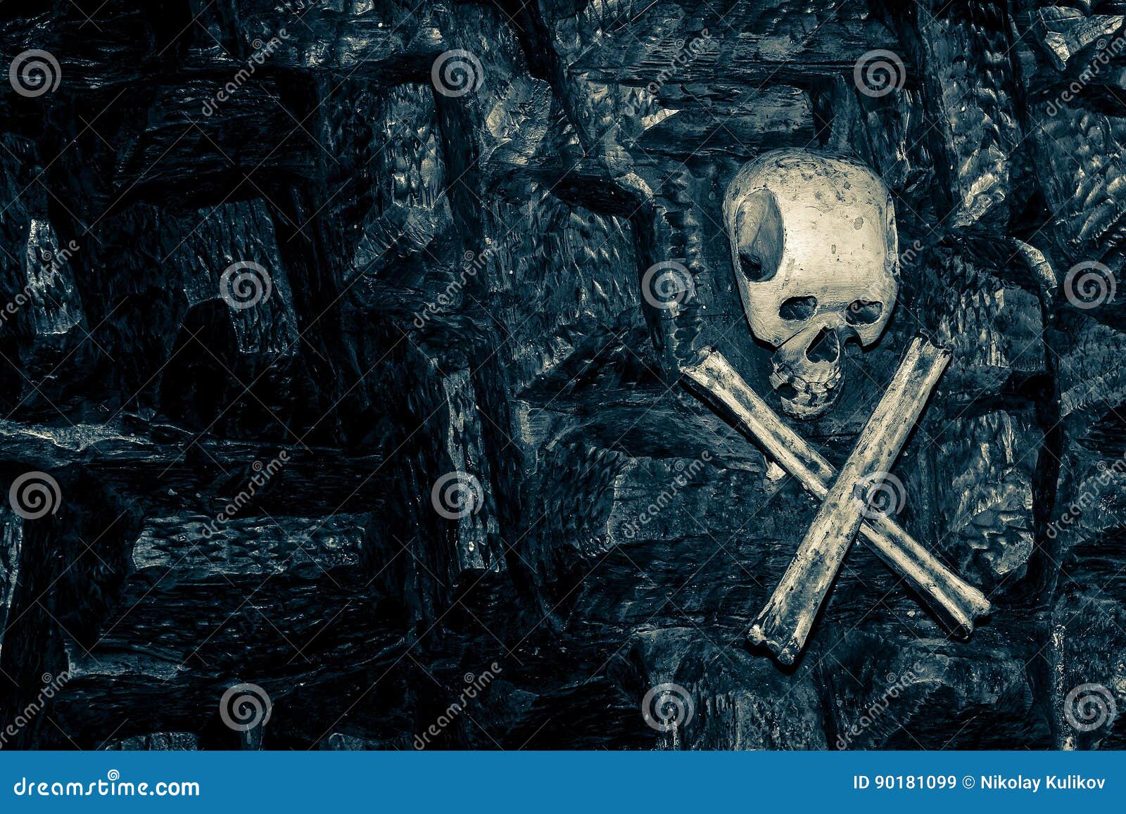 Skull and Crossbones Hanging on a Dark Rock Stock Image - Image of ...