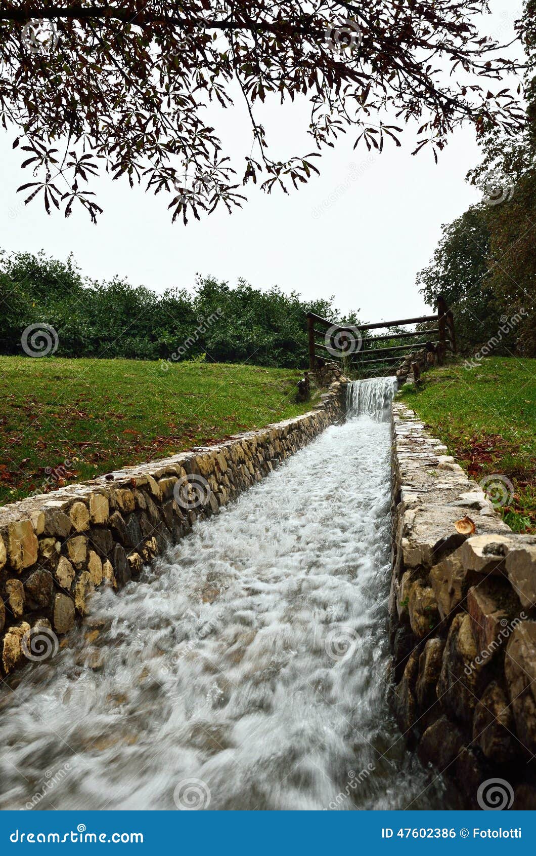 Artificial stream stock photo. Image of flow, soft, rock - 47602386 Artificial stream stock photo. Image of flow, soft, rock - 47602386