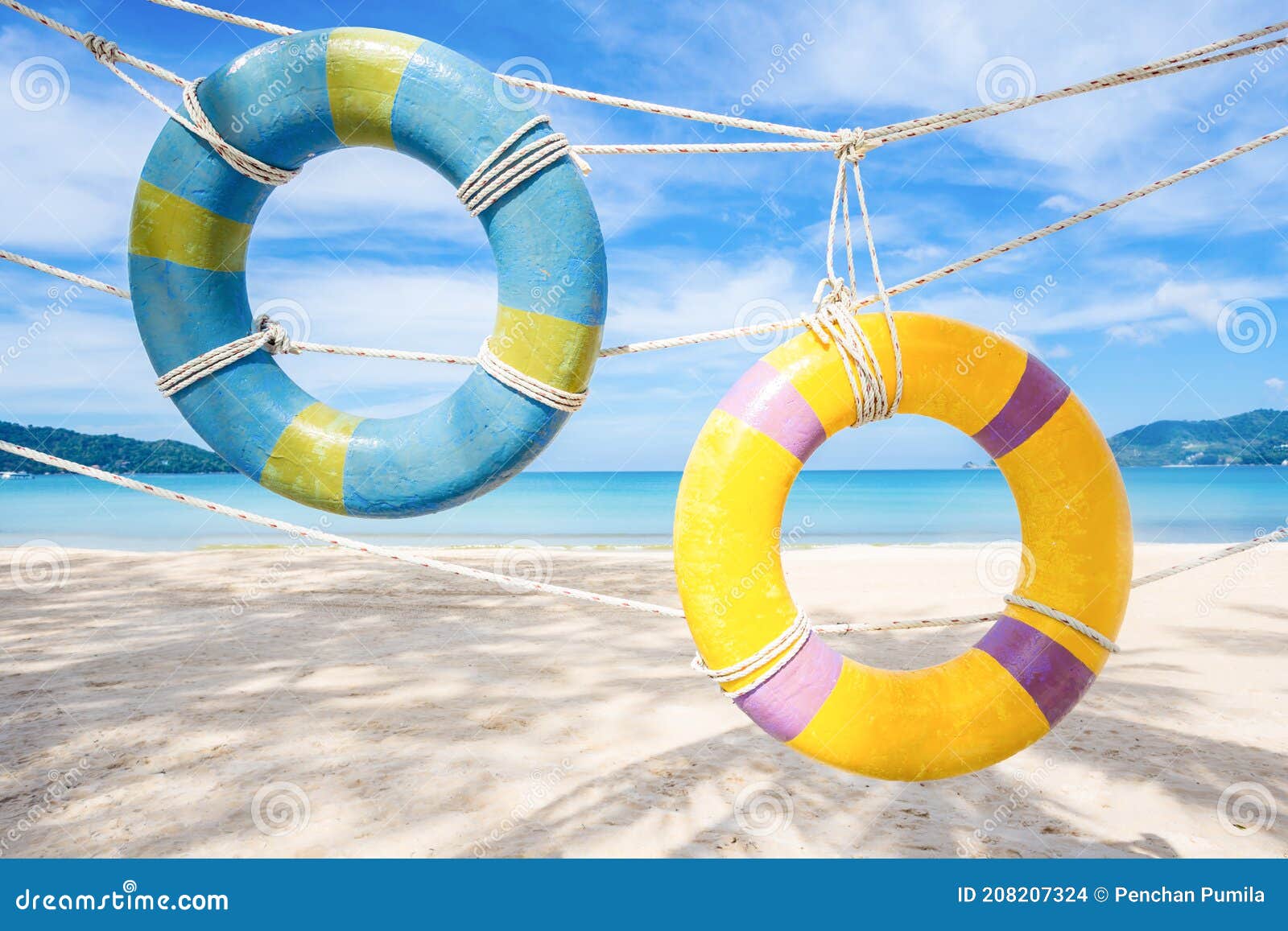 Artificial Swim Ring Rubber on the Beach with Blue Sky Stock Photo ...