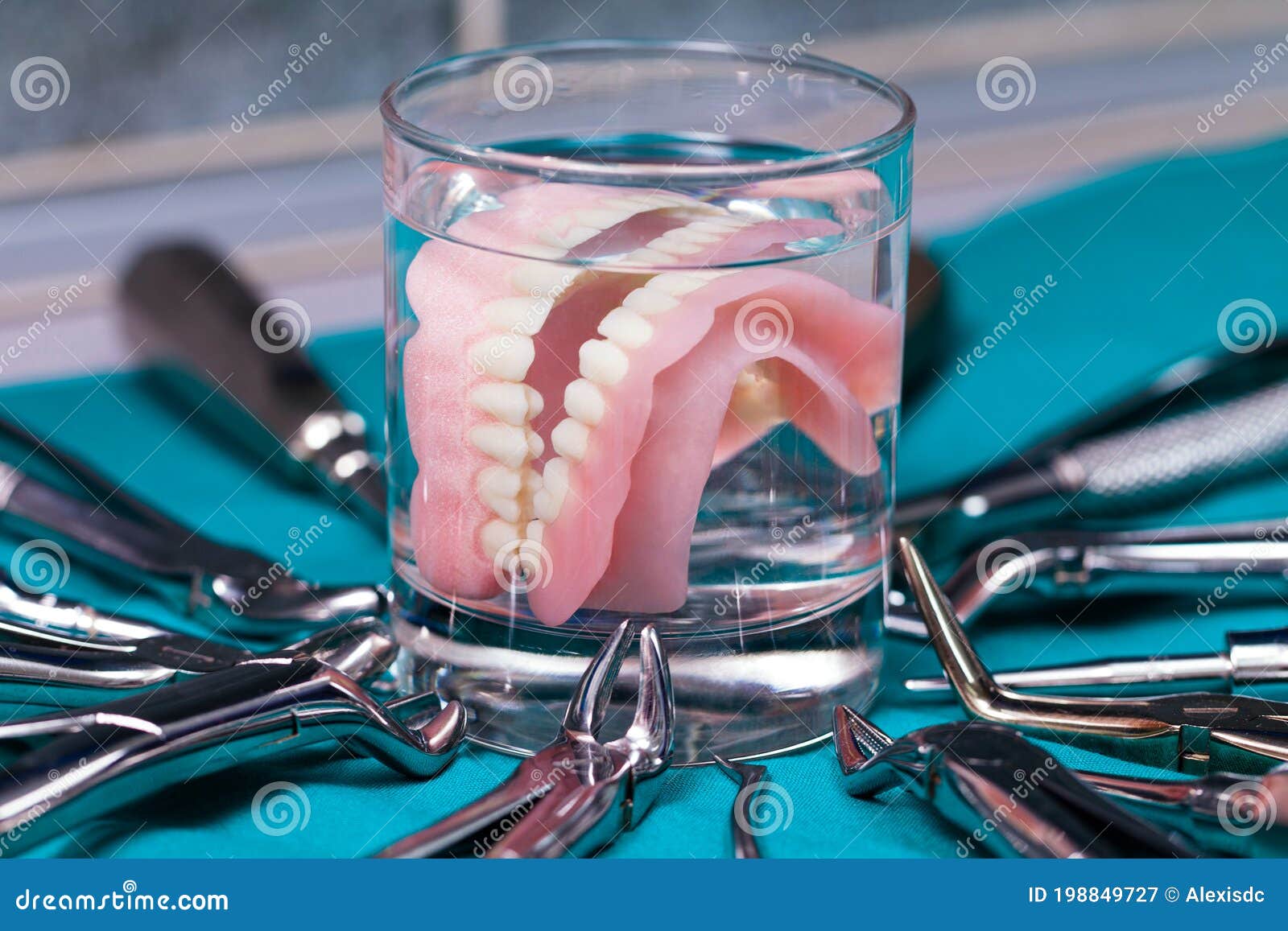 Artificial Teeth in a Cup with Dental Instruments Stock Image - Image ...