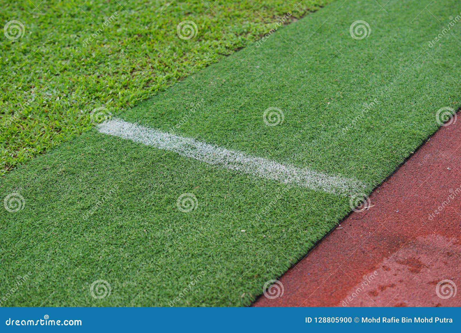 Artificial Track and Field with Green Grass Combined with Artificial ...