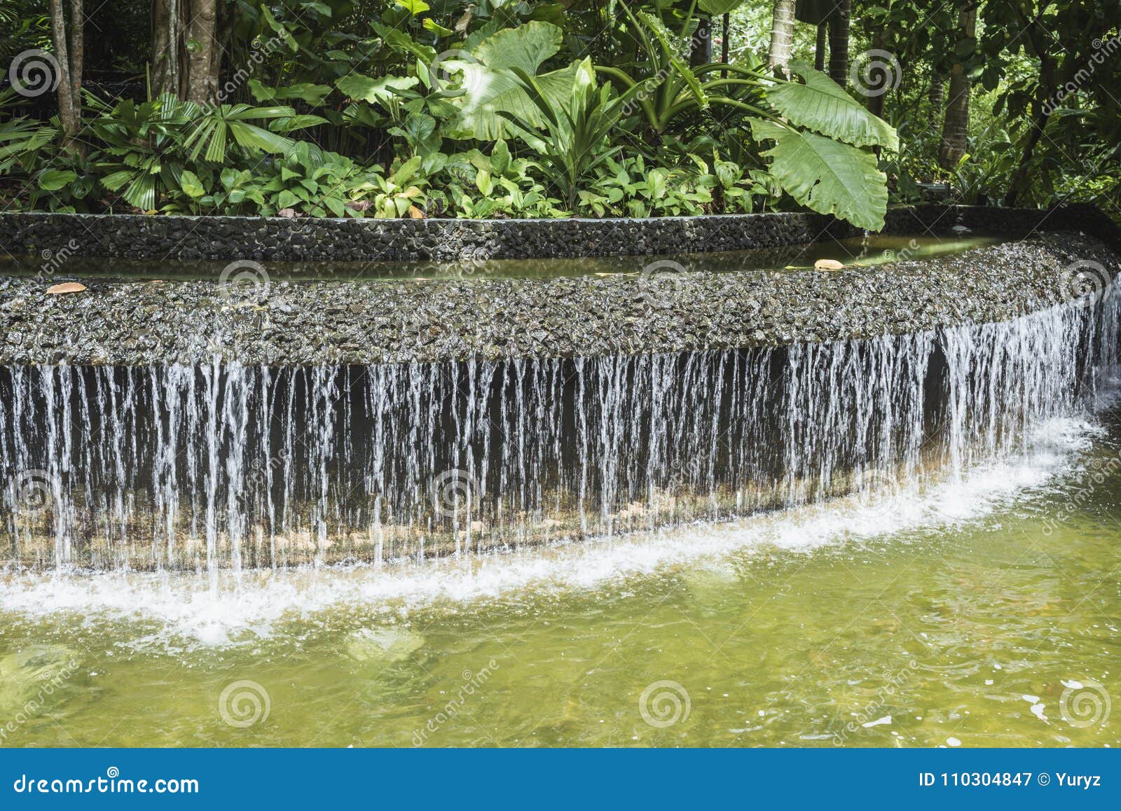 Artificial water cascade stock image. Image of garden - 110304847