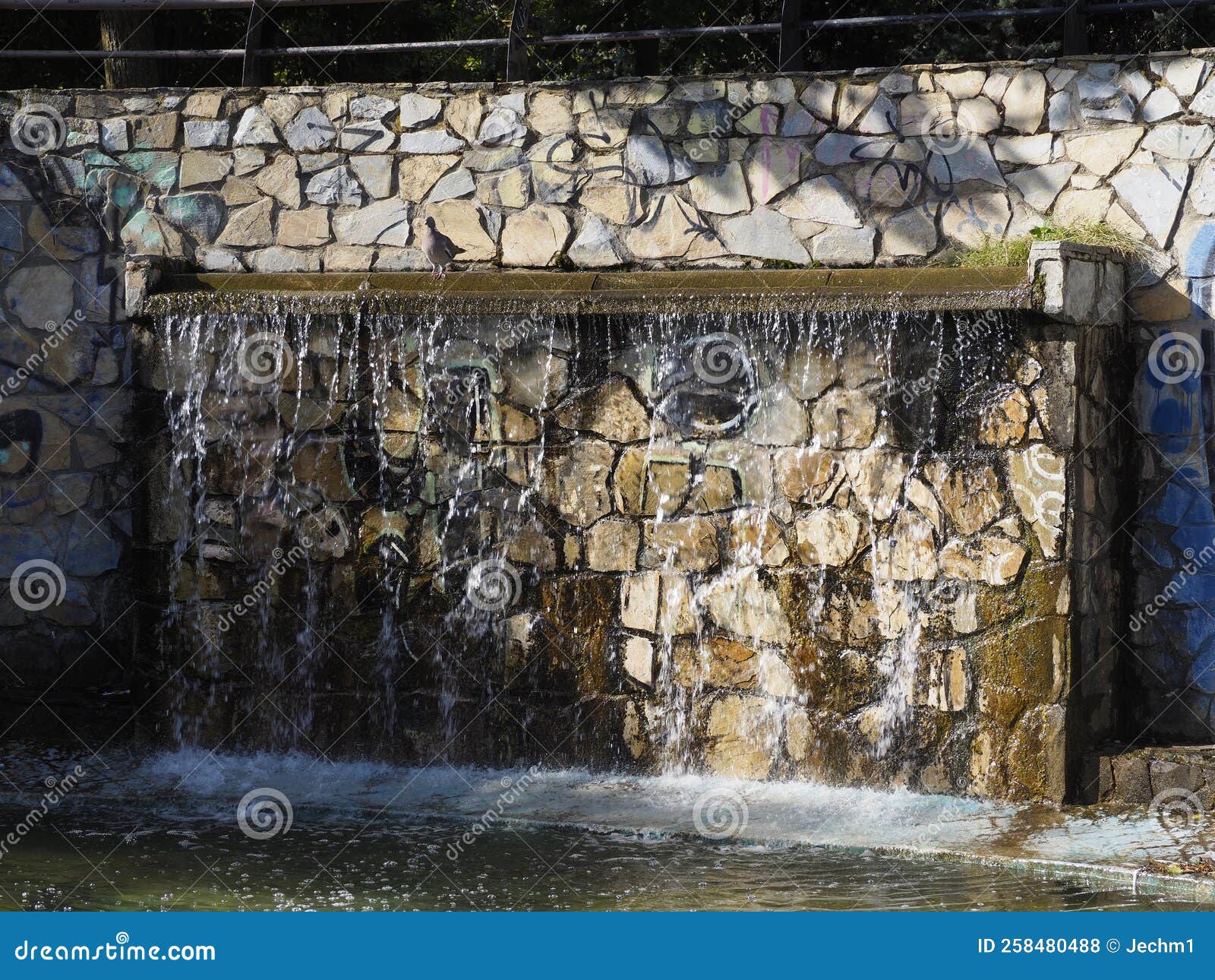 Artificial Waterfall in a Forest Park in Summer. Vacation Concept Stock ...