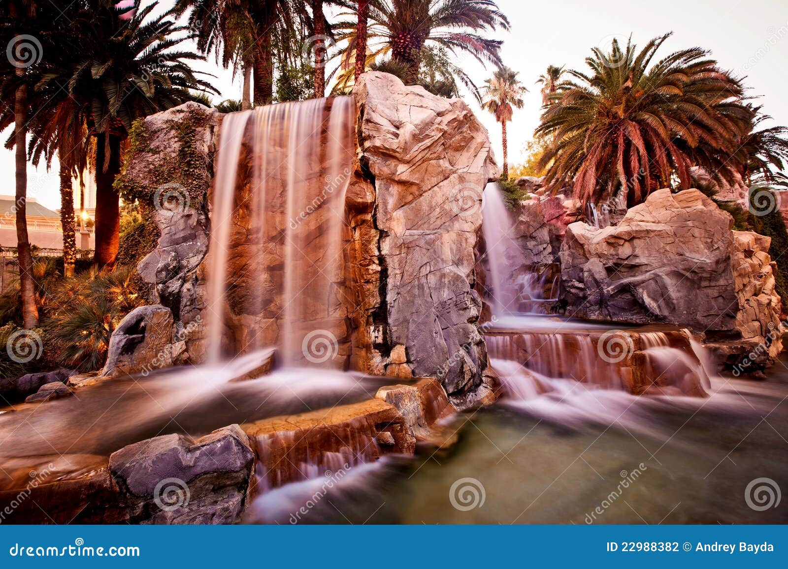 Artificial Waterfall with Palm Trees Stock Photo - Image of long, hotel ...