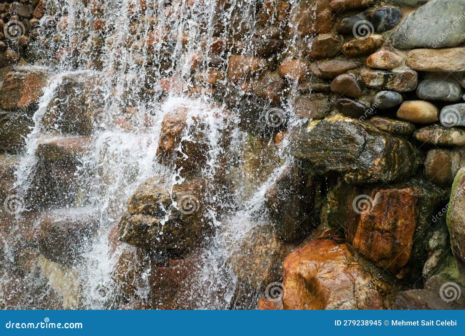 Artificial Waterfall on the Rocks Falling To Pool Stock Image - Image ...