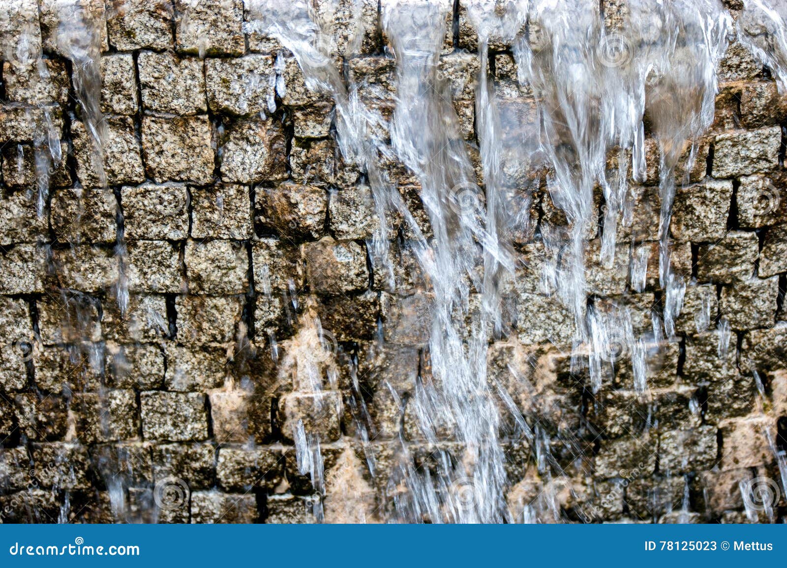 Artificial Waterfall. Water Stream Fall Down In Front Of Ancient Brick ...