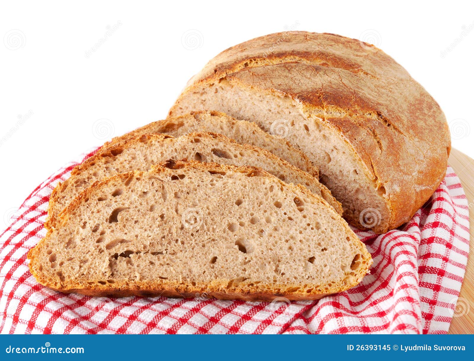 Artisan Bread On A Wooden Butcher Block In Parchment Paper Royalty-Free ...