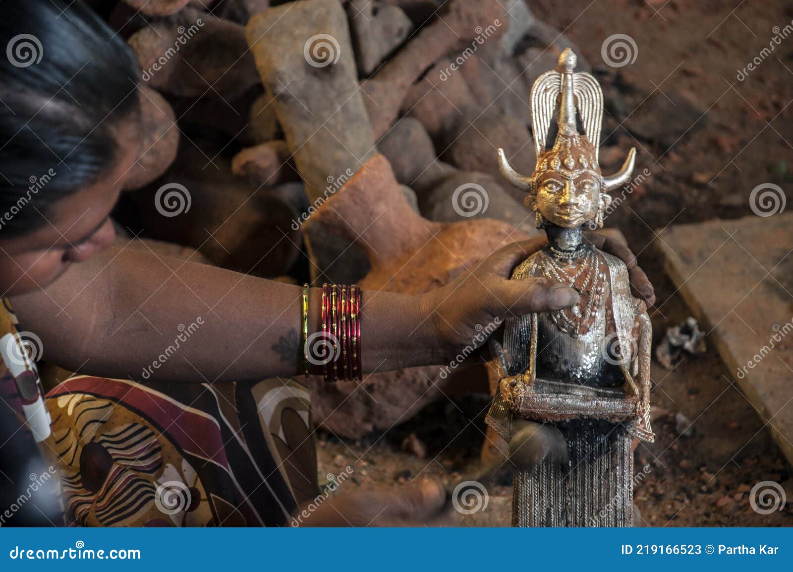 An Lady Artisan Busy with Making Dokra Objects in a Home Workshop in ...
