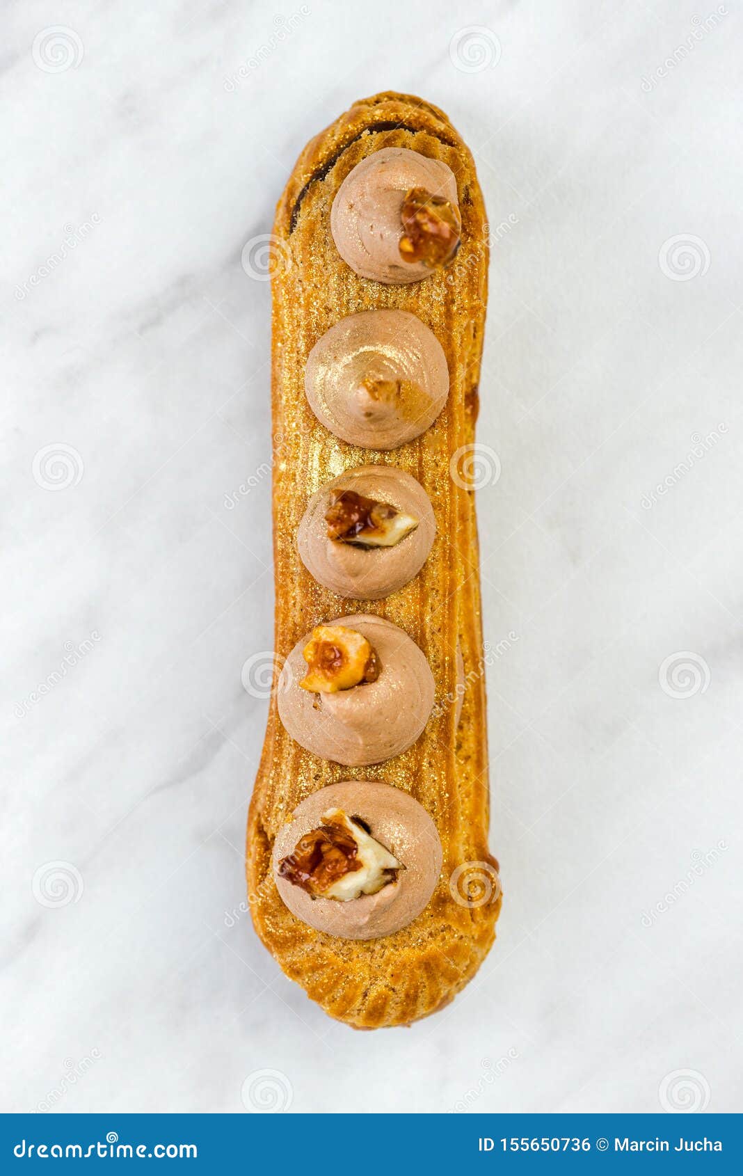 Artisan French Eclair Decorated on White Marble Stock Photo - Image of ...