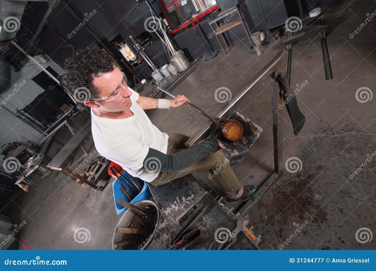 Artisan Handling Hot Glass stock image. Image of object - 31244777