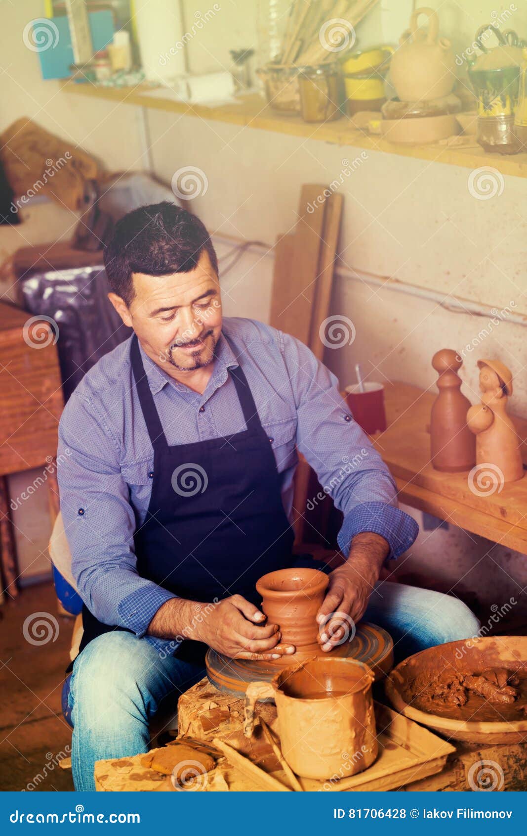 Artisan Man Creating Ceramic Piece on Spinning Pottery Wheel in Stock ...