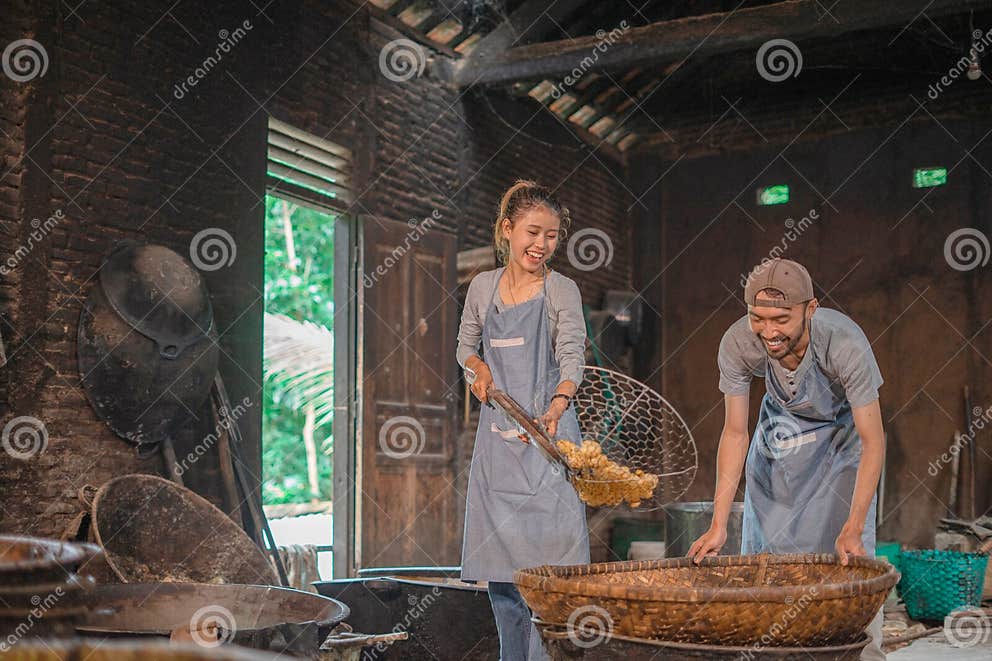 Artisans Engaged in Traditional Craftwork within a Charming Rustic ...