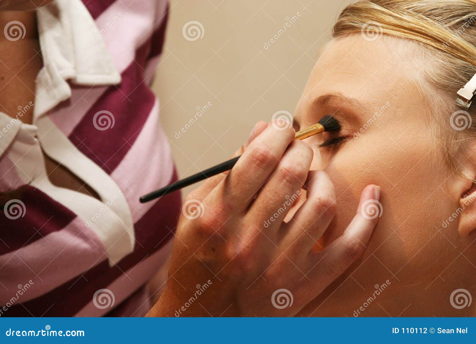 Artist applying cosmetics stock photo. Image of woman, hand - 110112