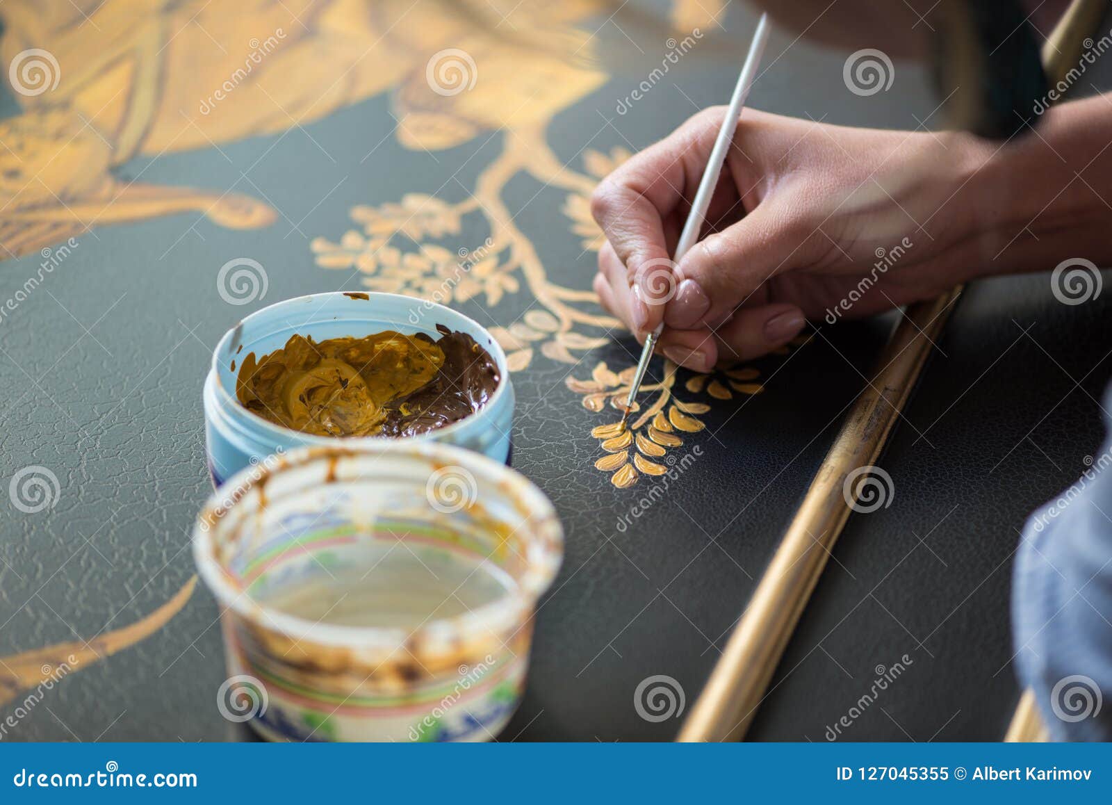 Artist decorator at work stock image. Image of craft - 127045355