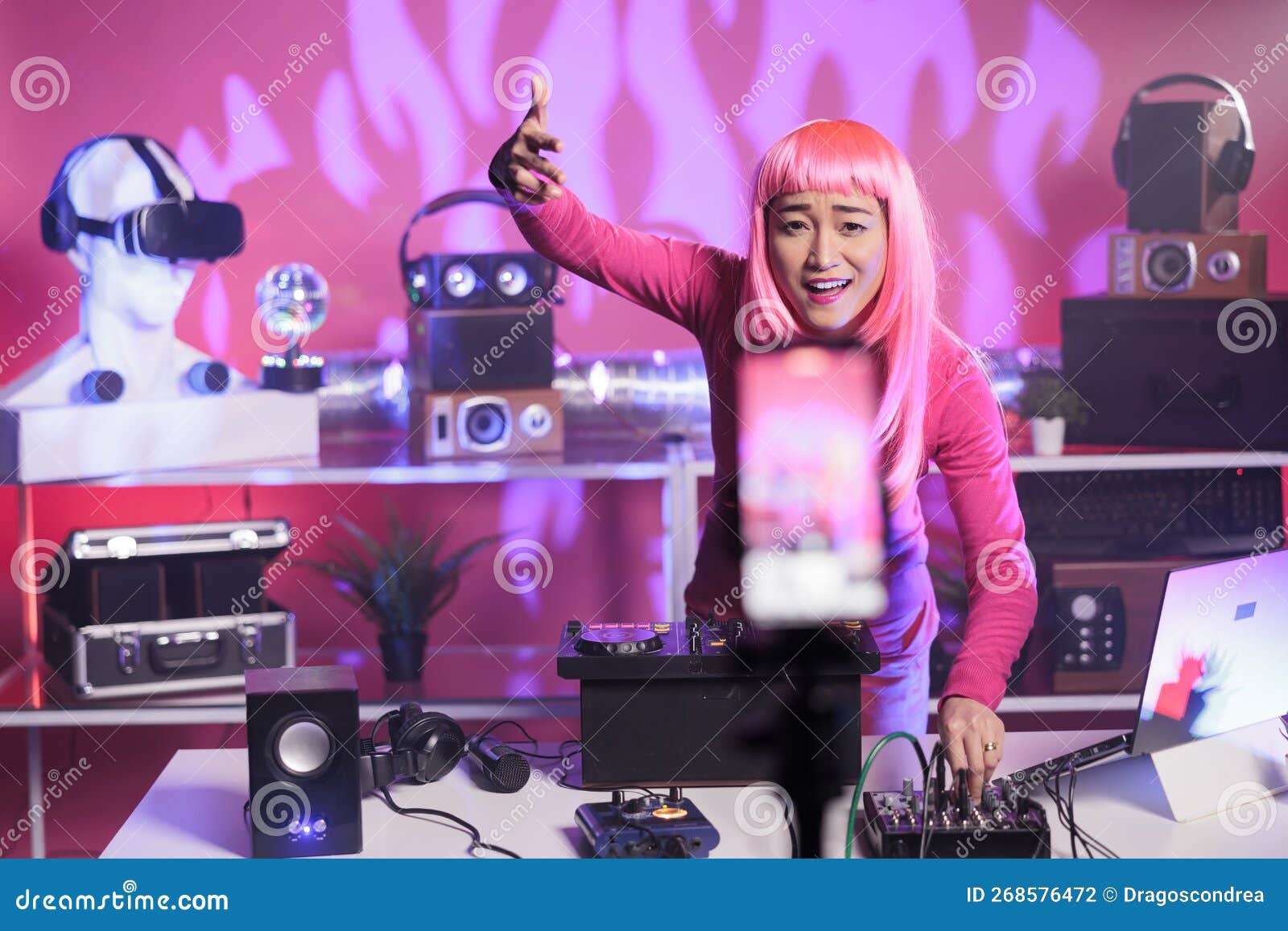 Artist Having Fun in Studio while Performing Electronic Song Using ...