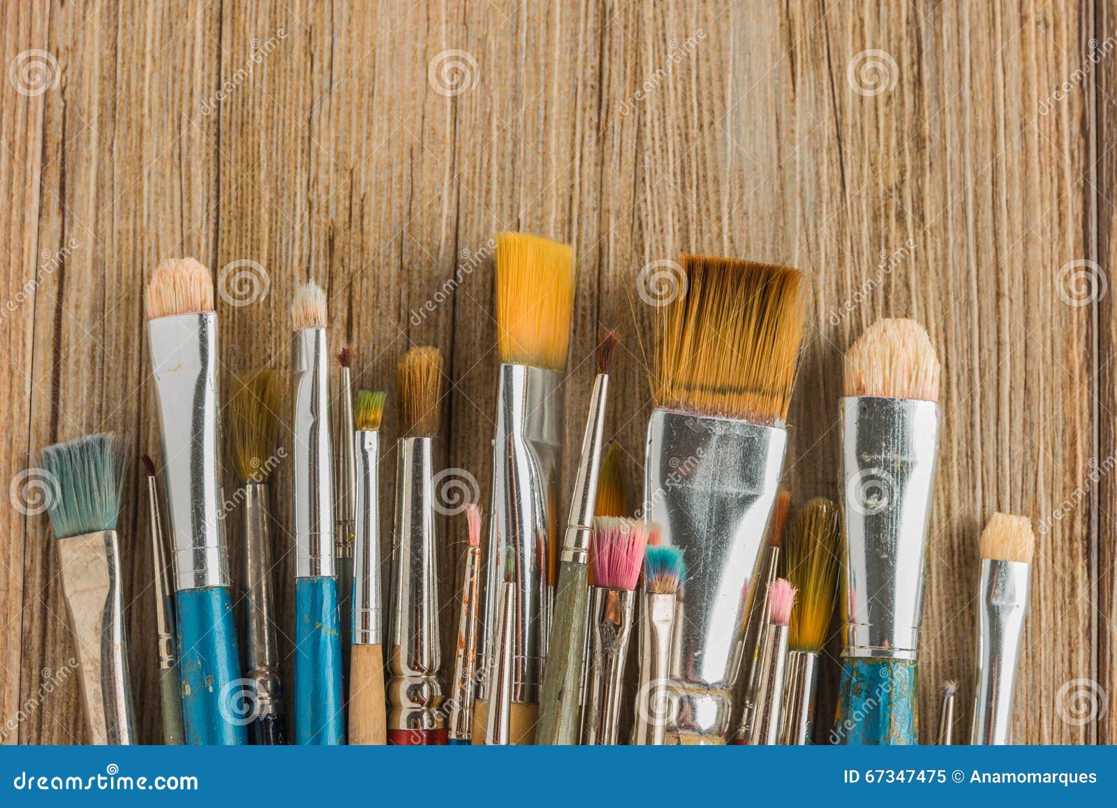 Artist Paint Brushes Over Rustic Wooden Texture Stock Image - Image of ...