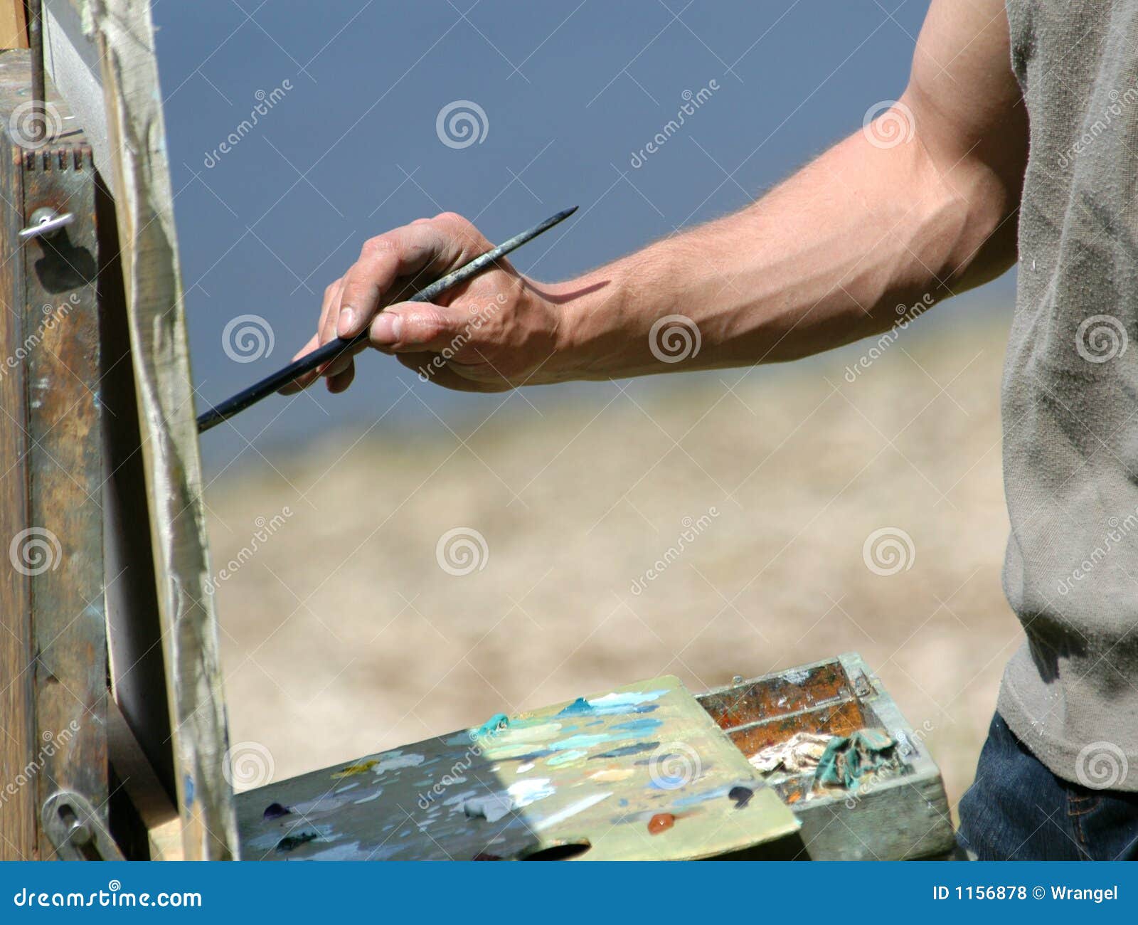 Artist s Hand with a Brush stock photo. Image of paint - 1156878