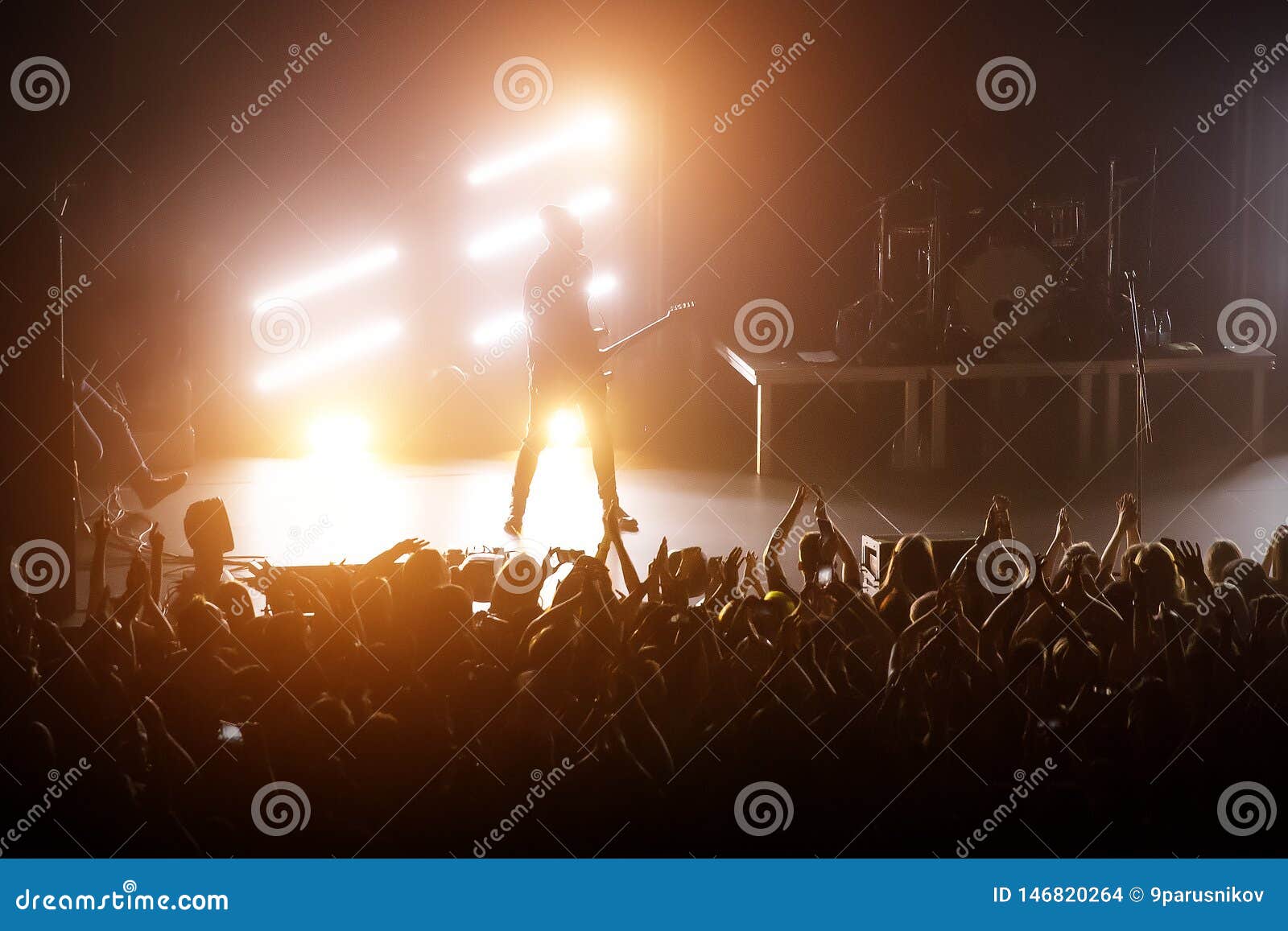 Artist on Stage. Full Hall Watching the Music Show Stock Photo - Image ...