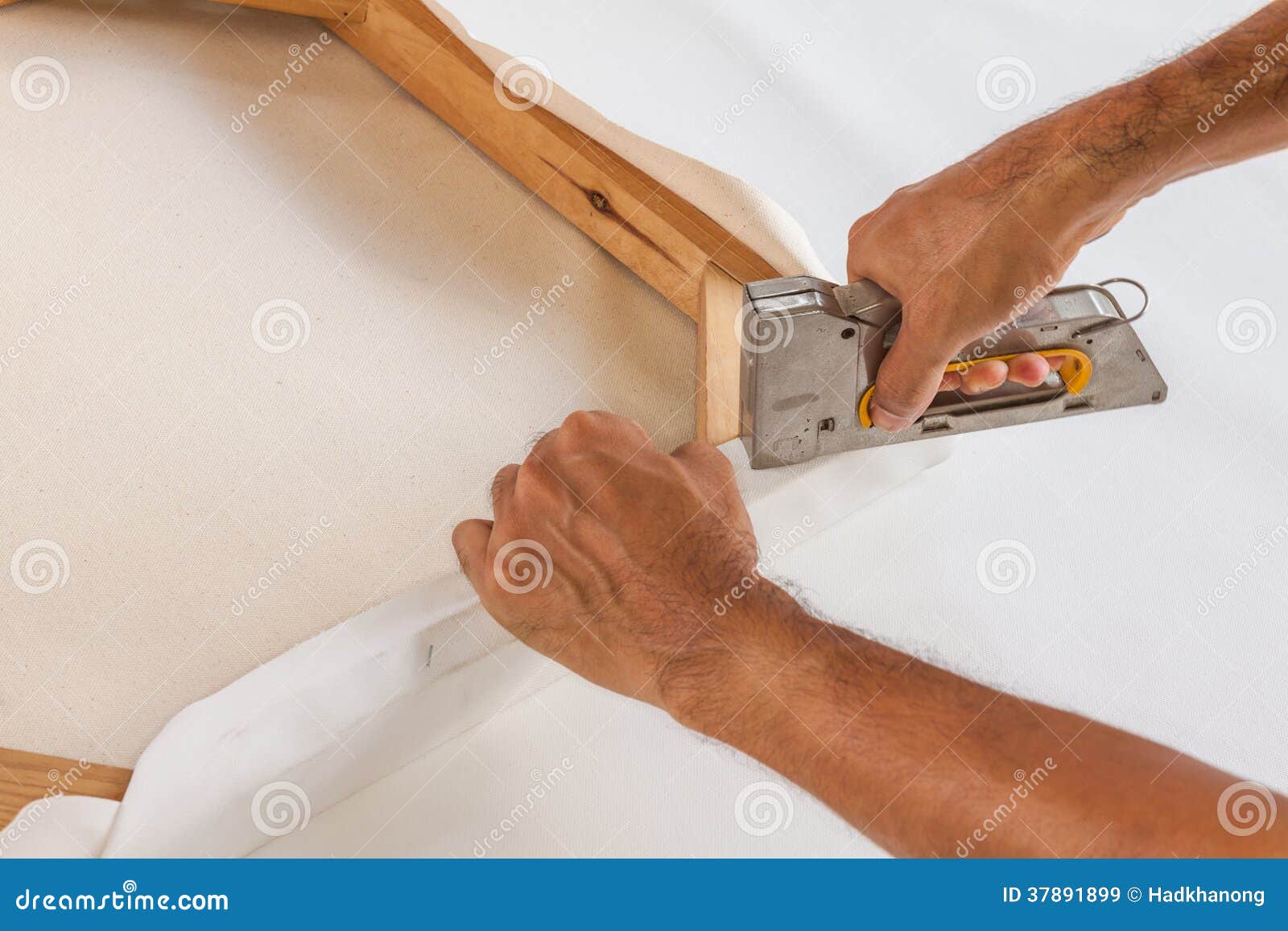 Artist stretching canvas stock image. Image of frame - 37891899