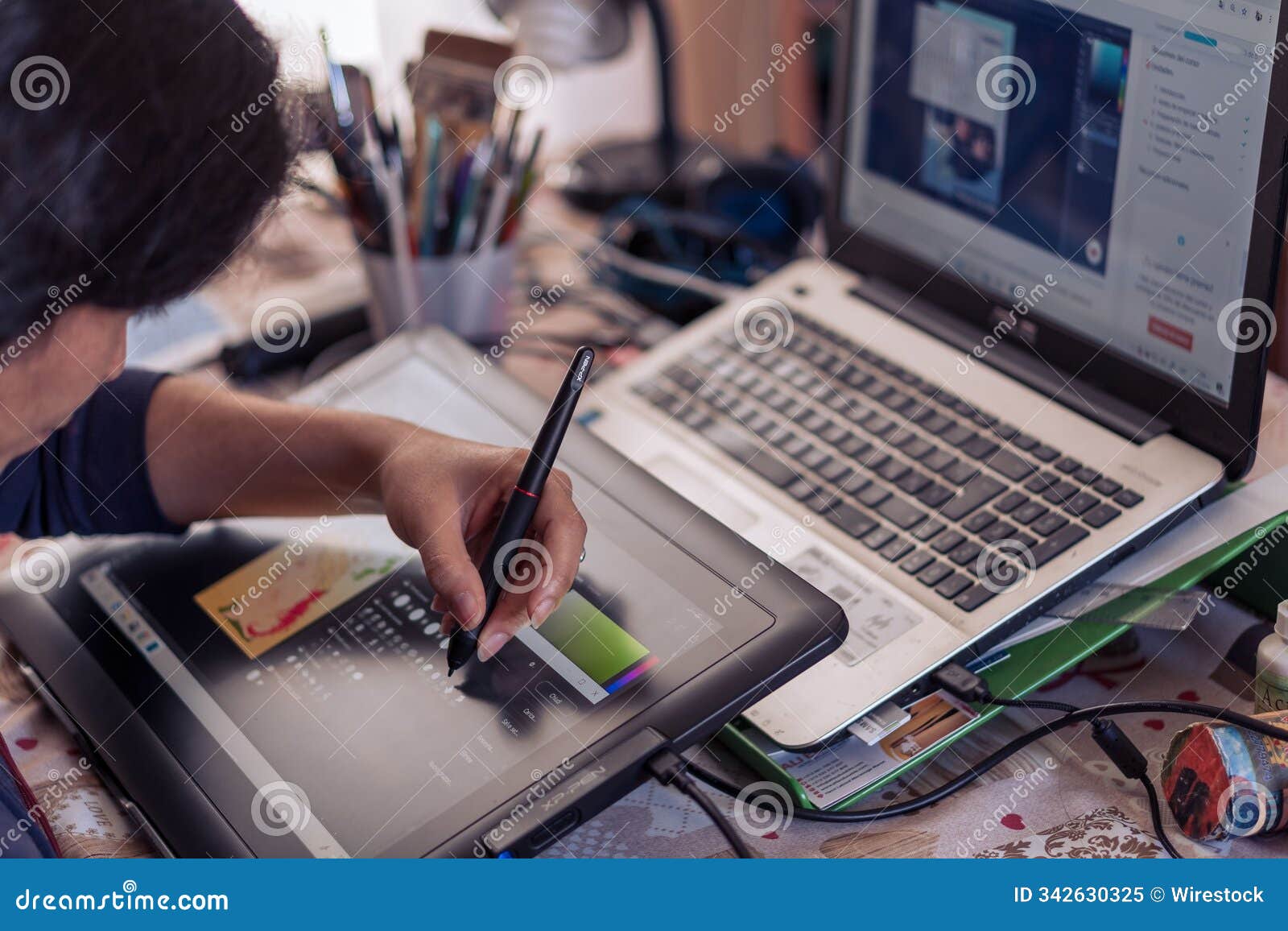 An Artist Uses a Wacom Tablet To Draw Comic Characters. the Image ...