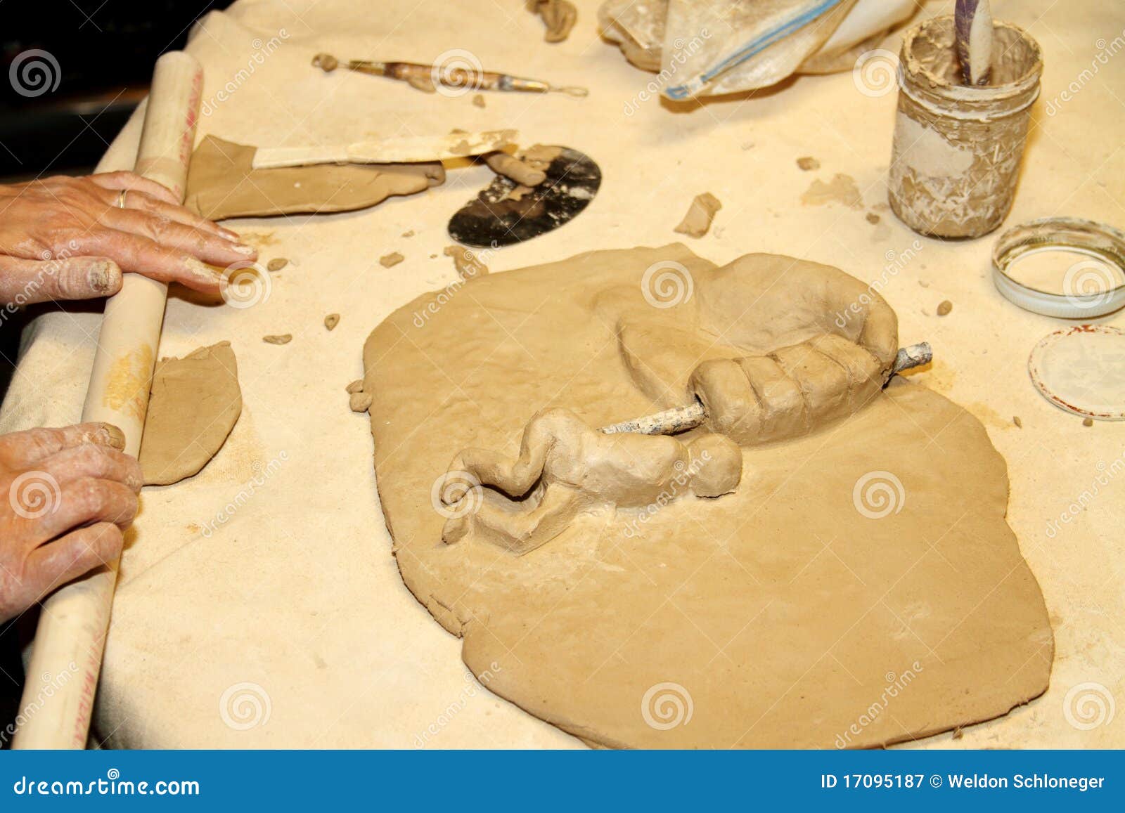 Artist working with clay stock image. Image of sculpt - 17095187