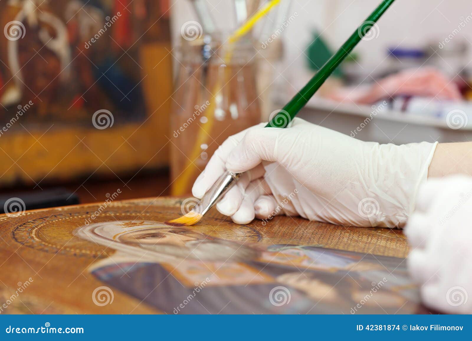 Artist works on the icon stock photo. Image of restoration - 42381874