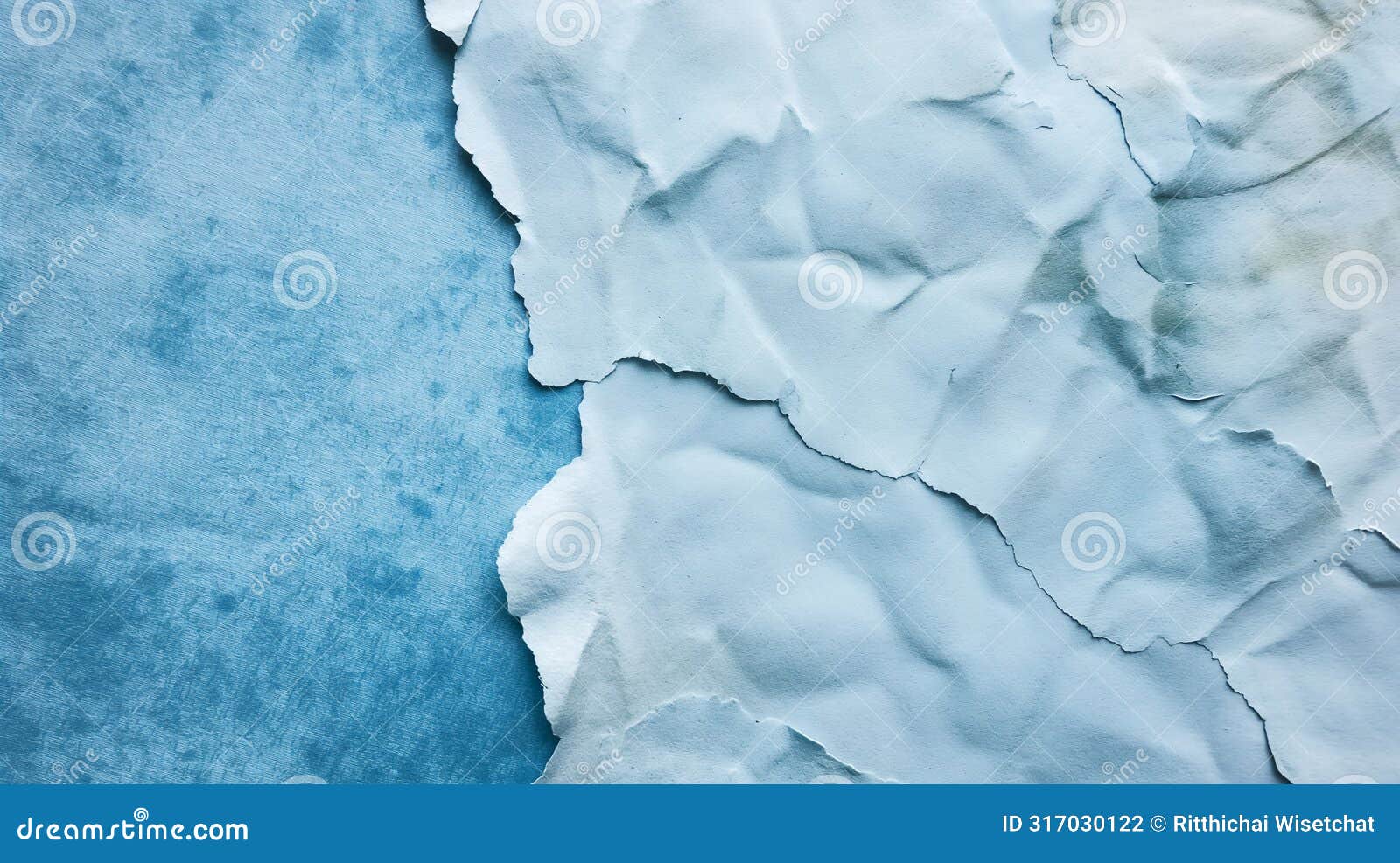 Artistic Composition of Torn Paper Layers in Shades of Blue, Creating a ...