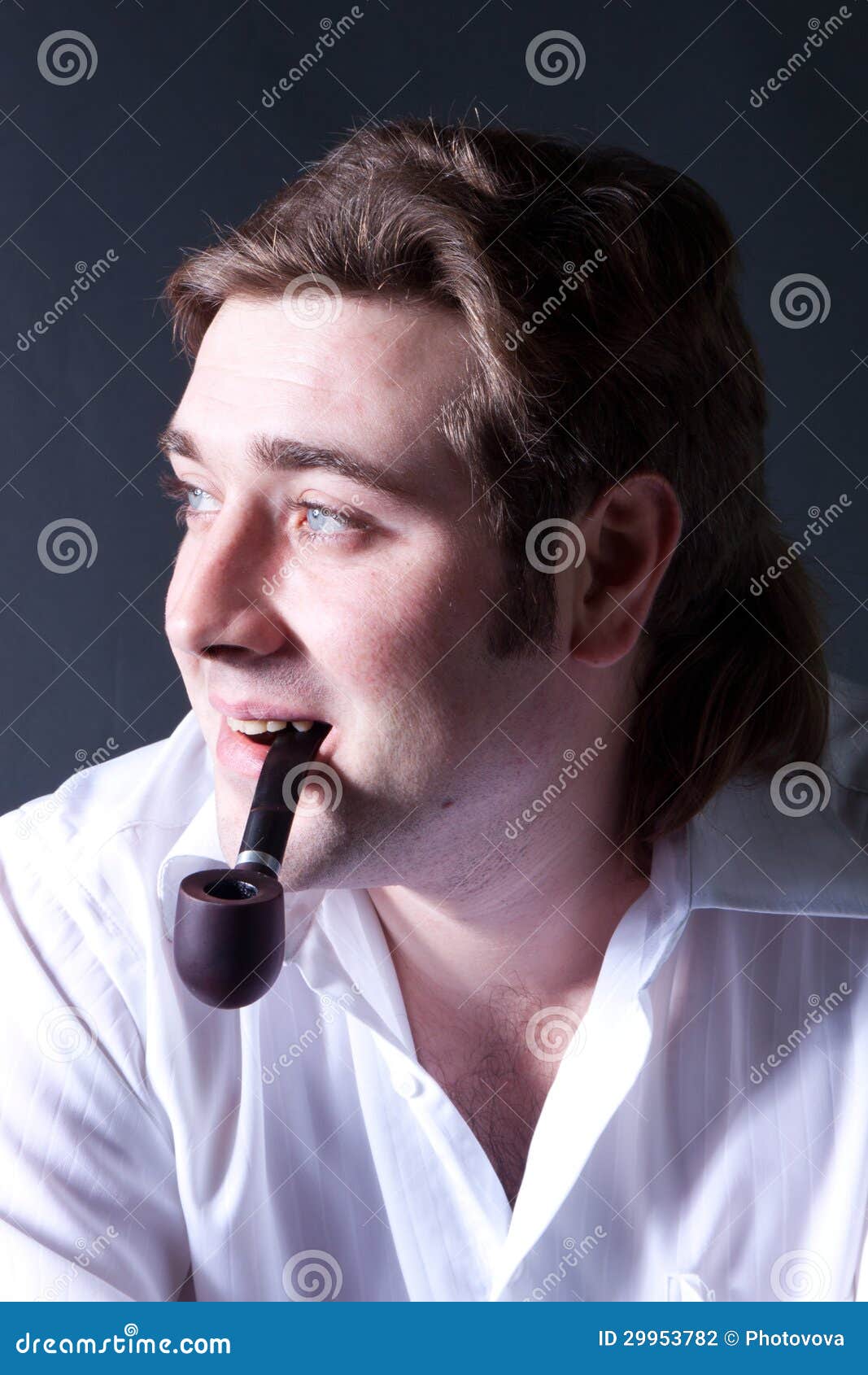 Young man smoking a pipe stock photo. Image of closeup - 29953782