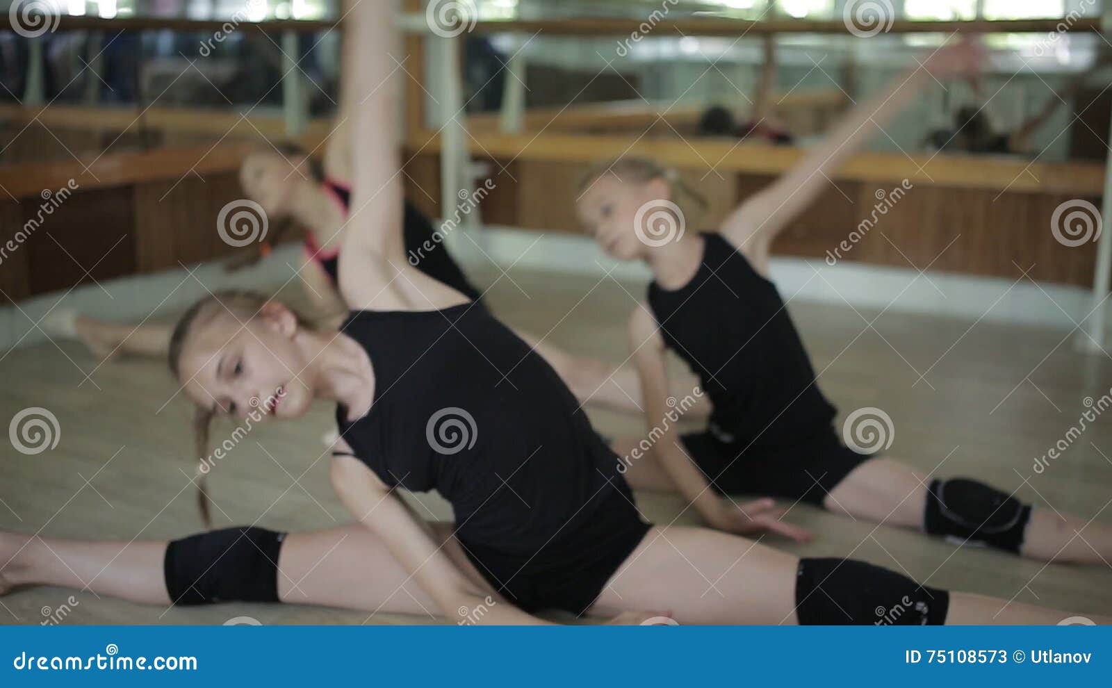 Artistic Gymnasts Warming Up Sitting On The Splits Stock Video Video