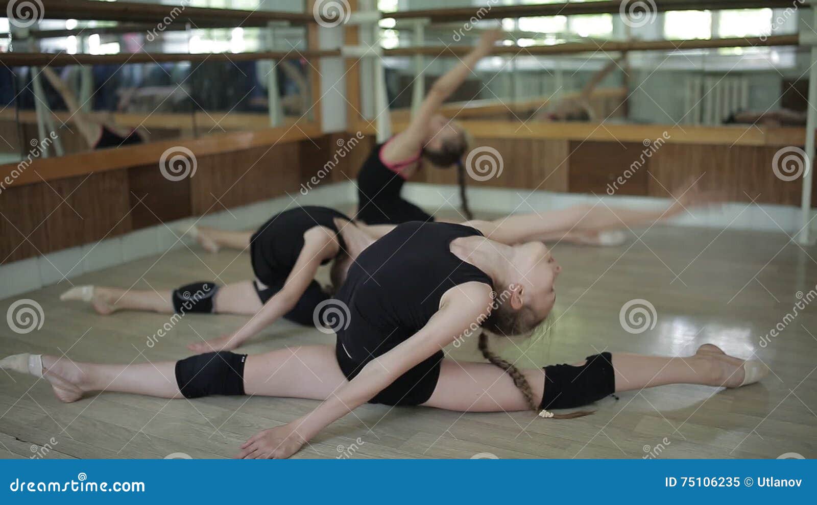 Artistic Gymnasts Warming Up Sitting On The Splits Stock Video Video