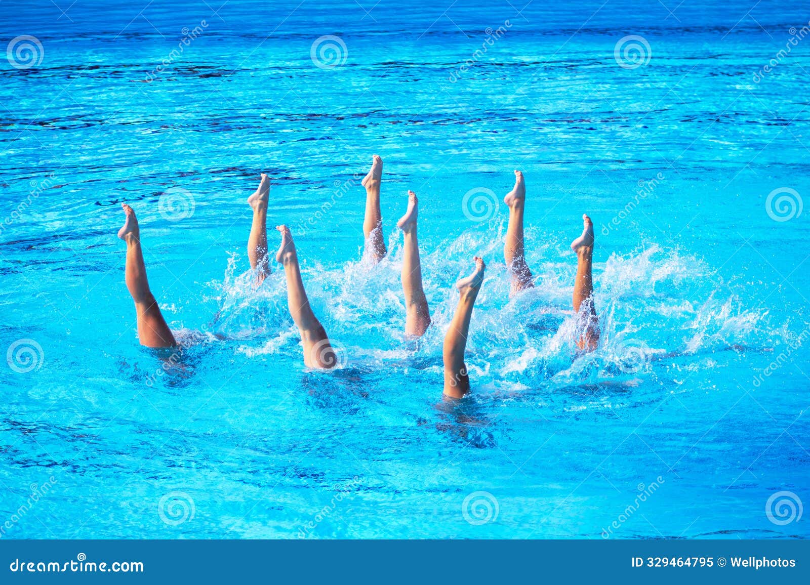 Artistic Swimmers Team Performing Synchronized Choreographed Routine in ...