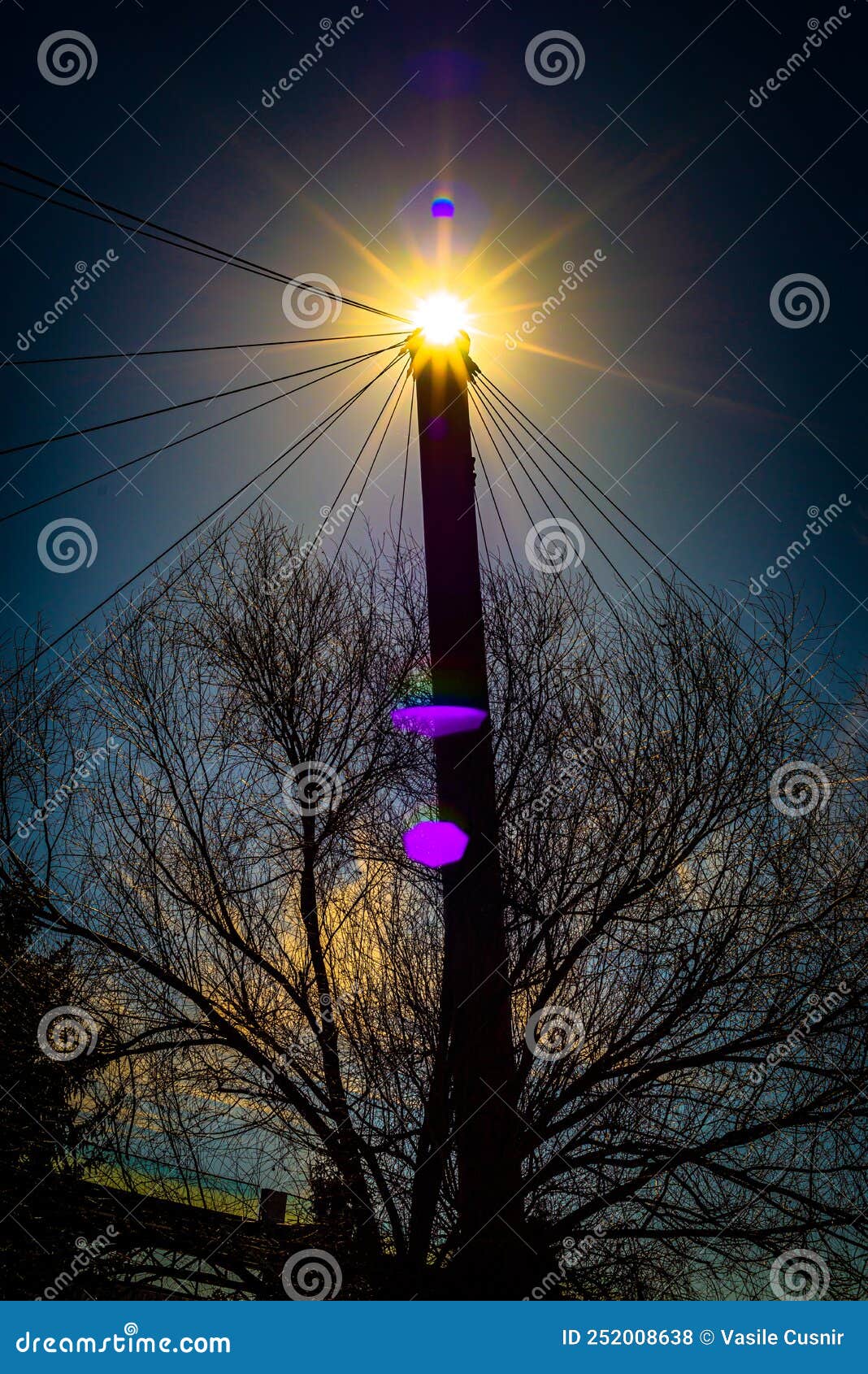 Artistic View of a Pillar with the Sun on the Top Stock Photo - Image ...