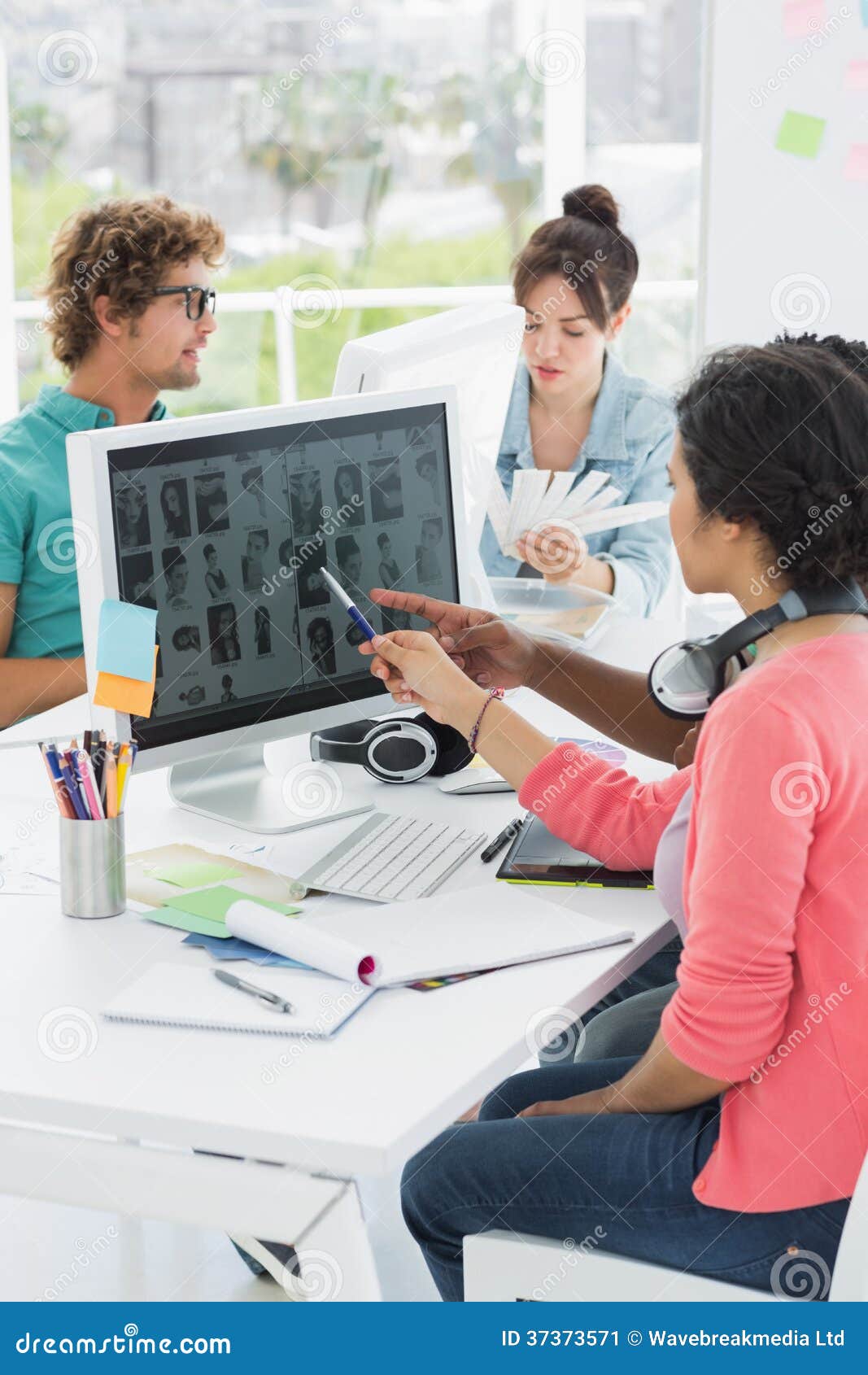 Artists Working at Desk in Creative Office Stock Image - Image of black ...