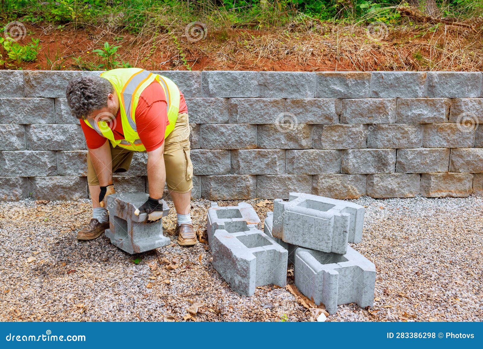 As Construction Worker Lifted Concrete Block, To Ensure Its Proper ...