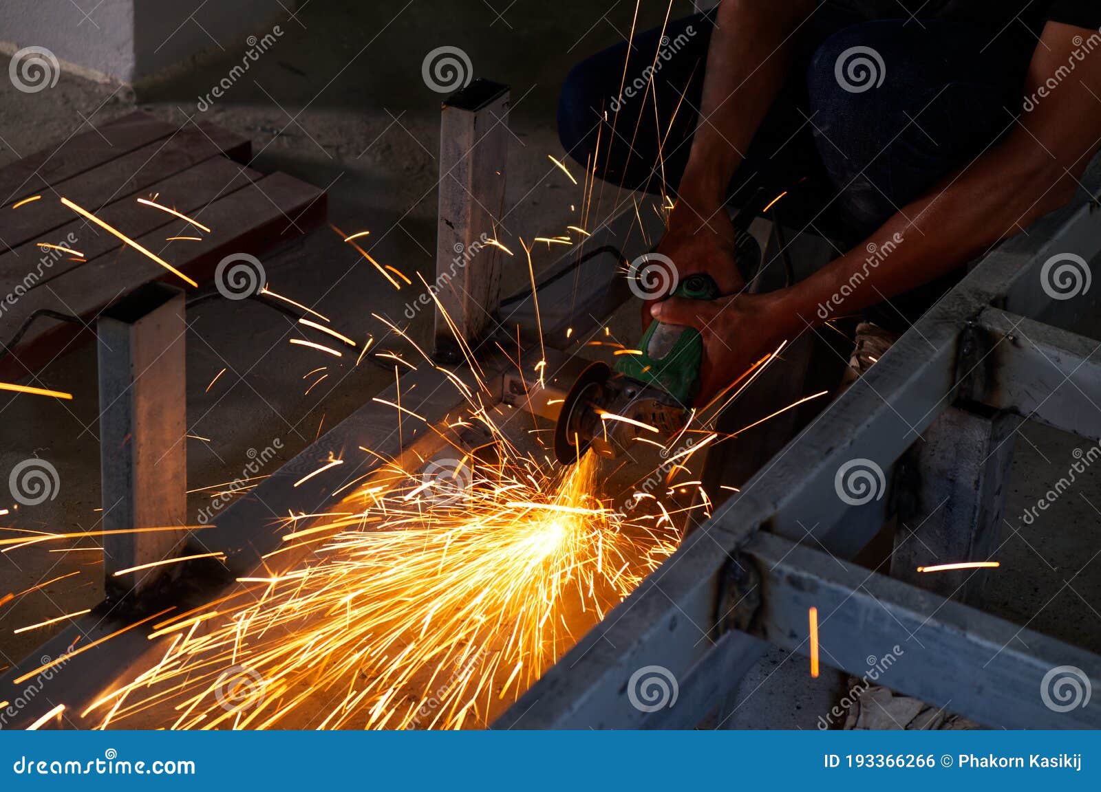 Unsafe Worker Cutting Metal Construction with No Protection Uniform ...