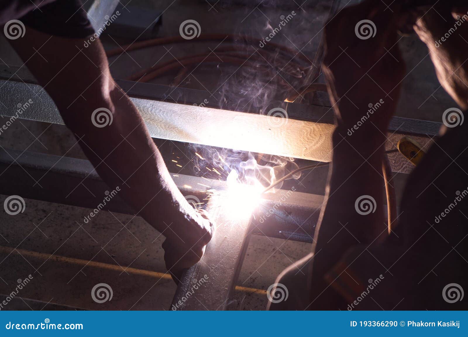 Unsafe Welder Working with No Protection Uniform, Weld Metal with Arc ...