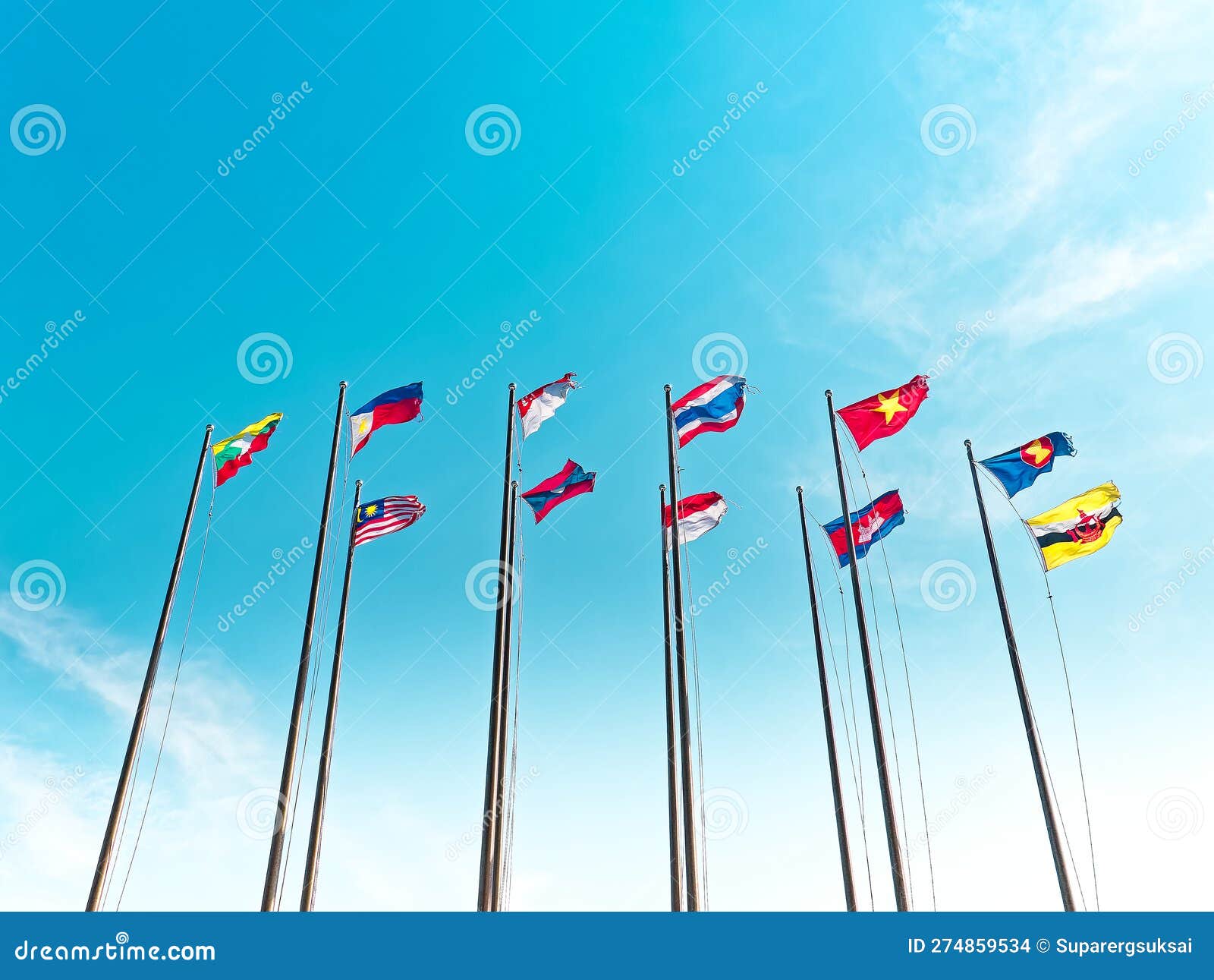 Low Angle View of Waving Flags of ASEAN Countries Against Blue Sky ...